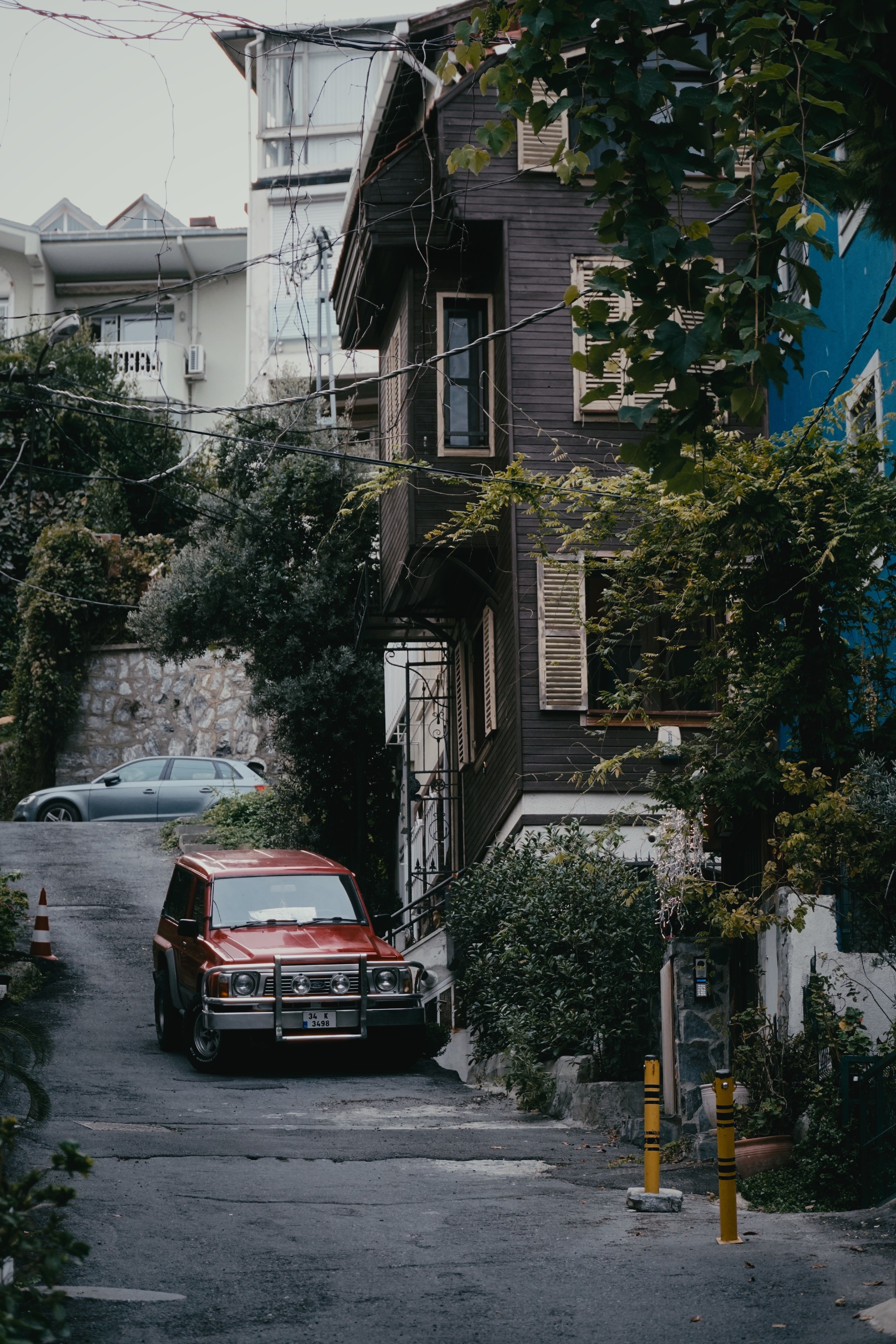 Charming Historic Street in İstanbul with Red Car · Free Stock Photo