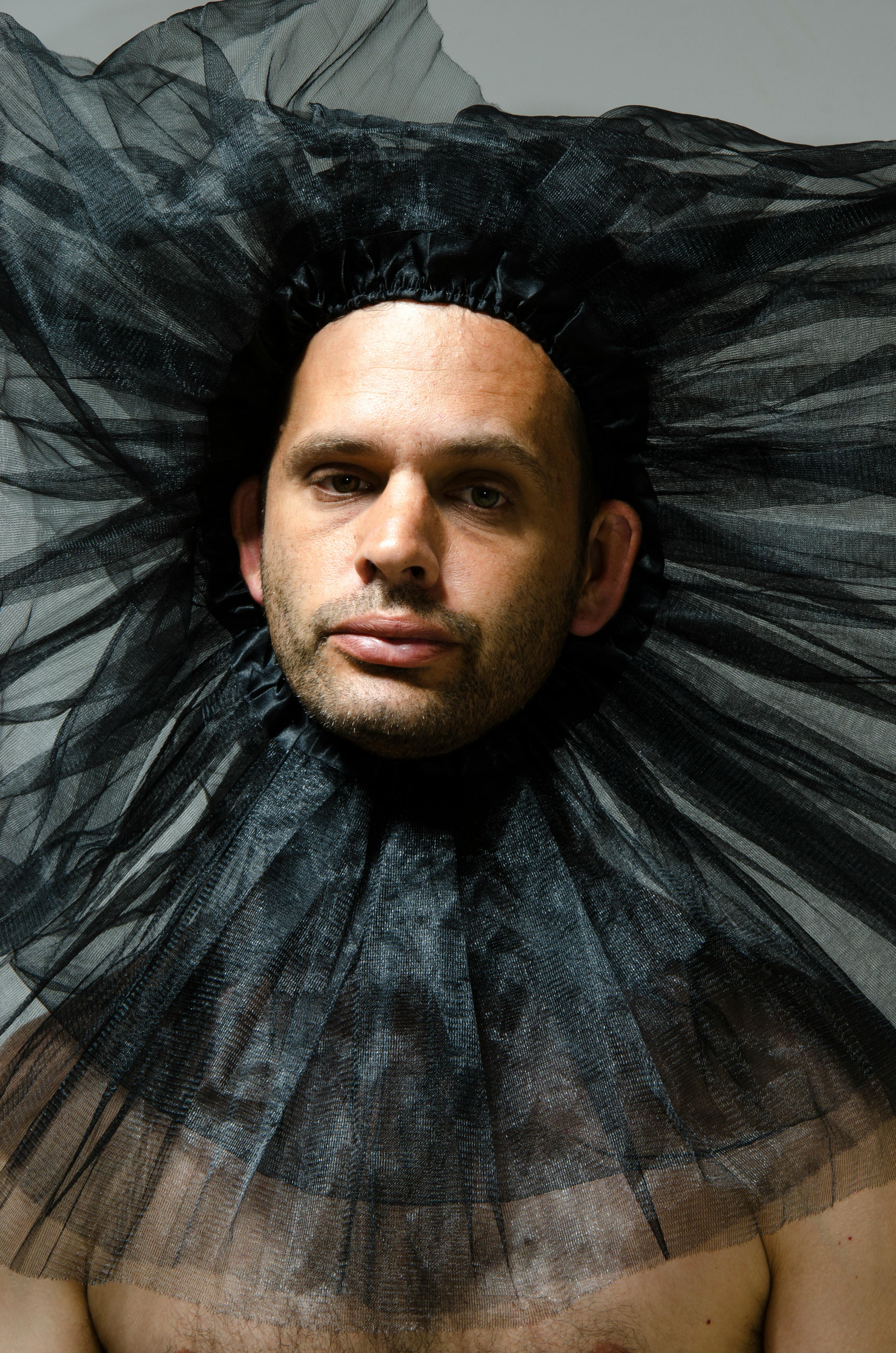 Creative Portrait of Man Wearing Black Ruff Collar · Free Stock Photo