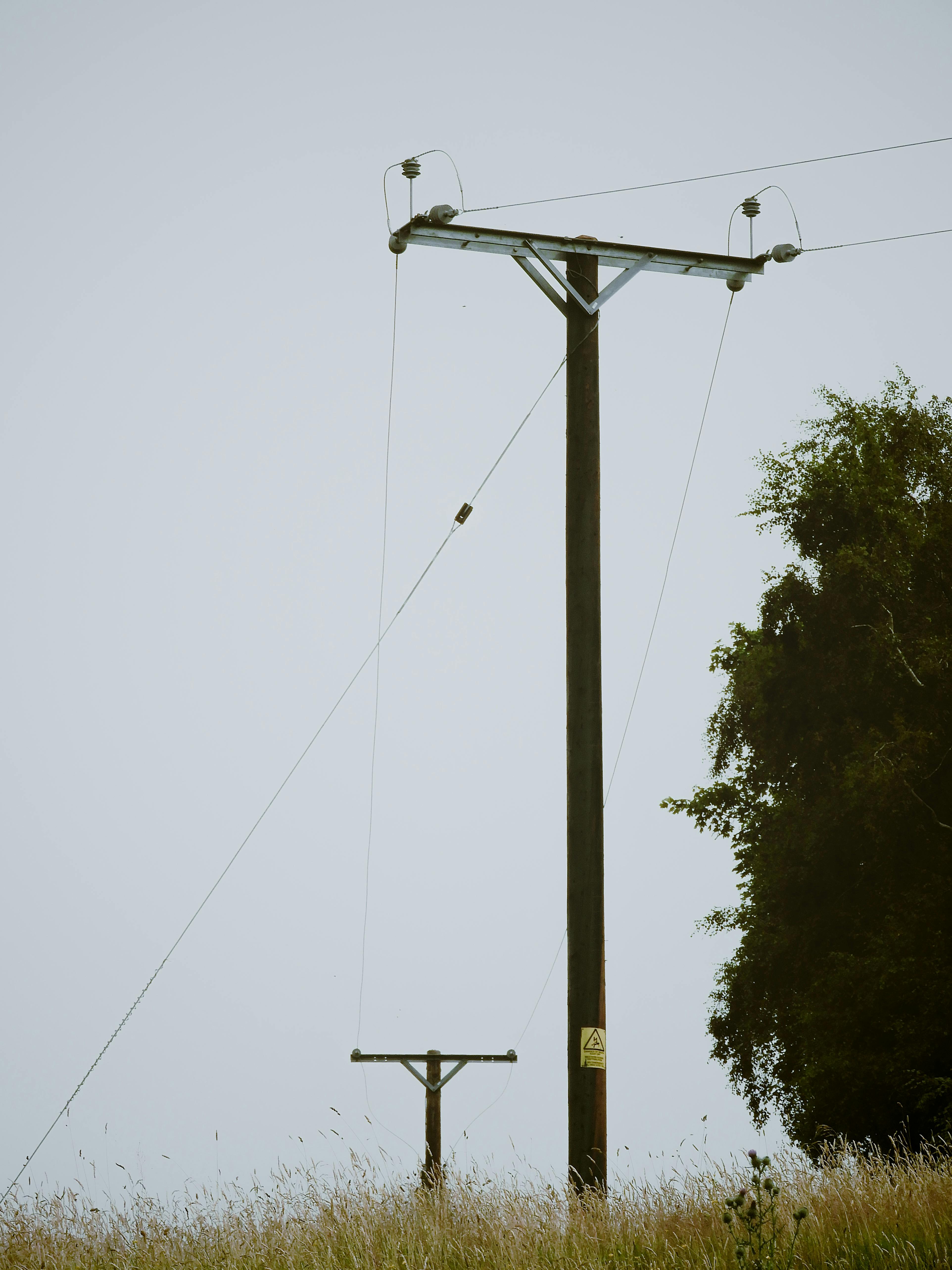 Minimalist Power Line in Rural England Landscape · Free Stock Photo