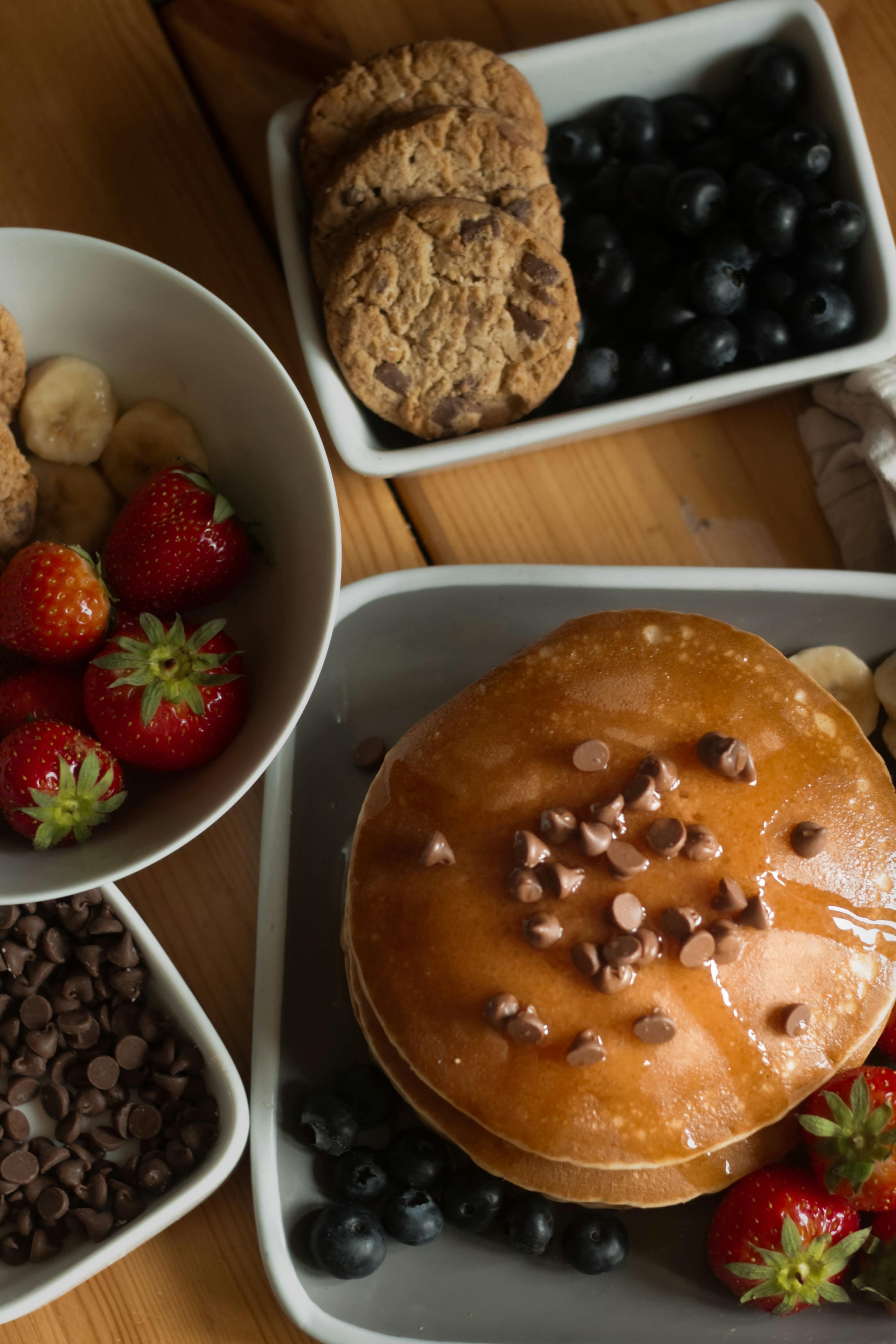 Delicious Breakfast with Pancakes and Fresh Fruits · Free Stock Photo