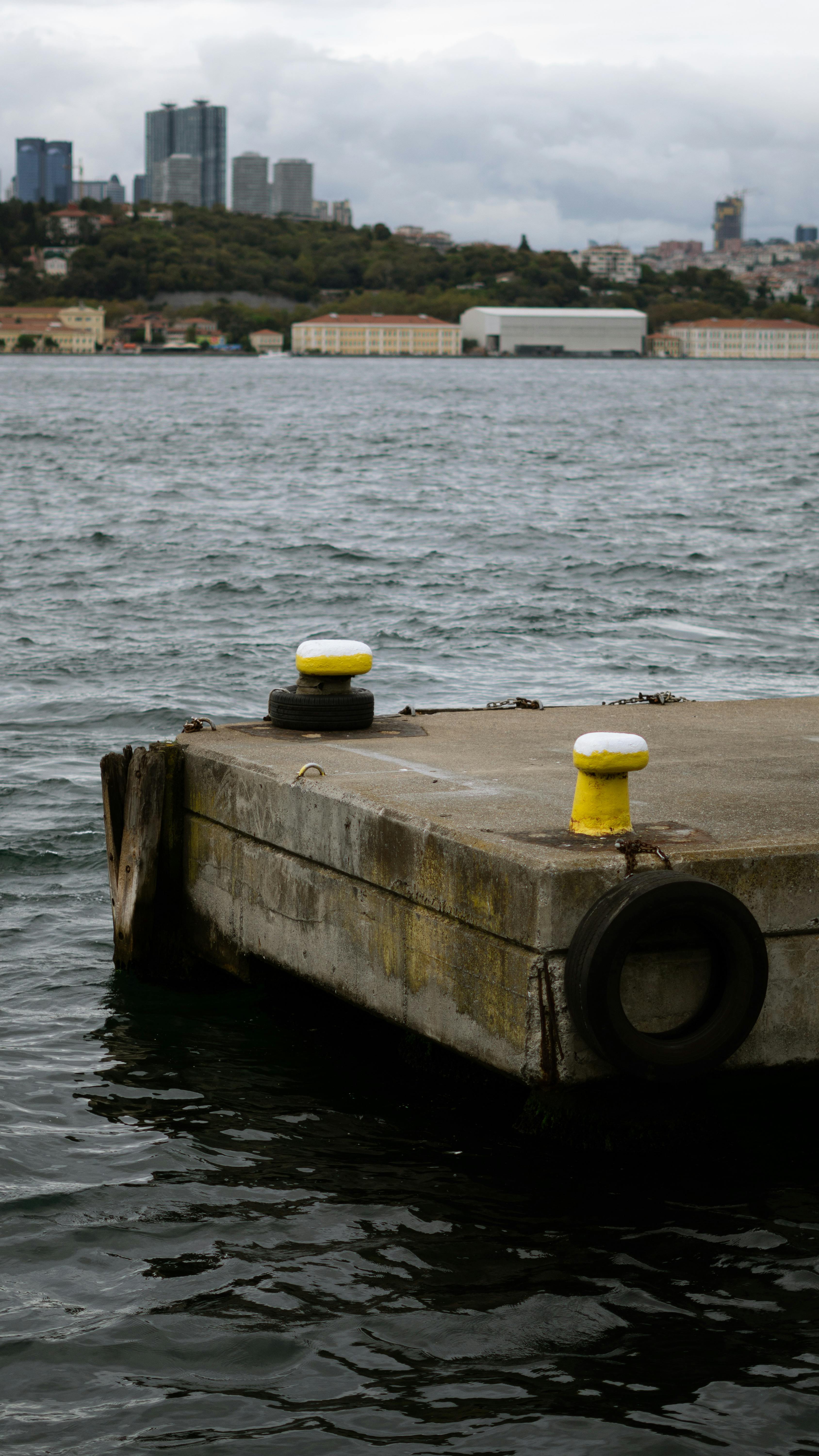 Urban Dock with City Skyline in Background · Free Stock Photo