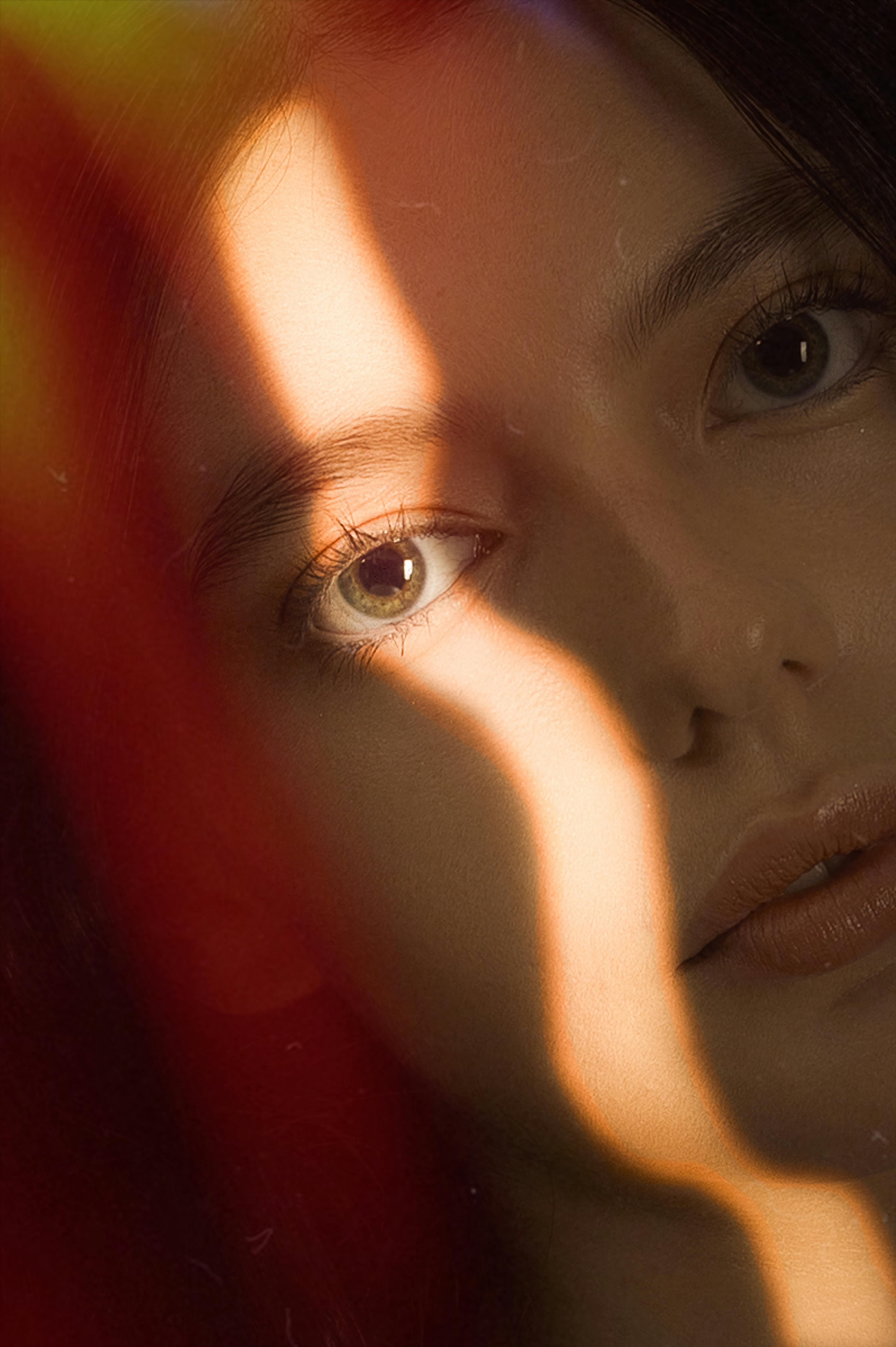 Close-up Portrait with Artistic Shadows and Highlights · Free Stock Photo