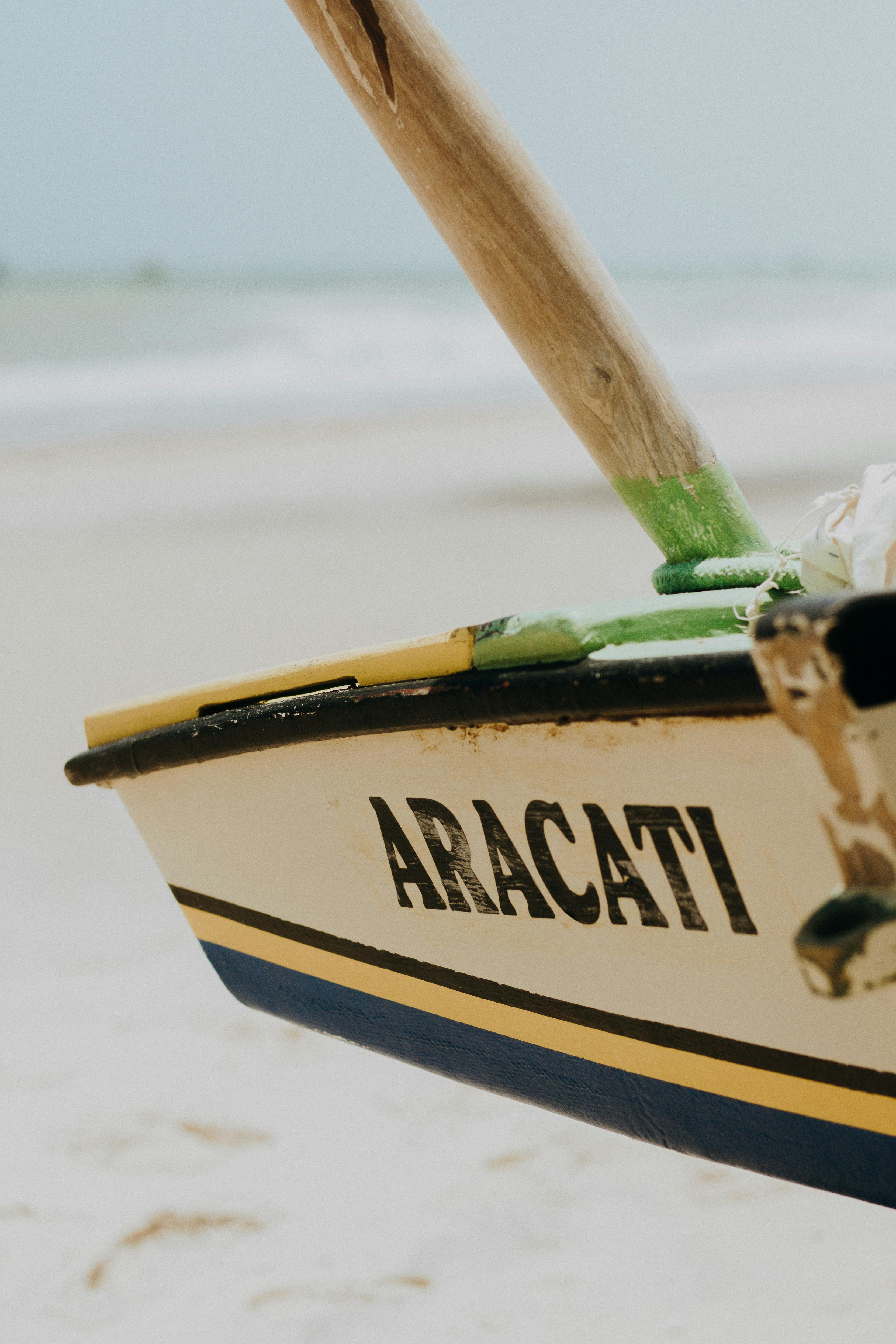 Traditional Fishing Boat on Aracati Beach, Brazil · Free Stock Photo