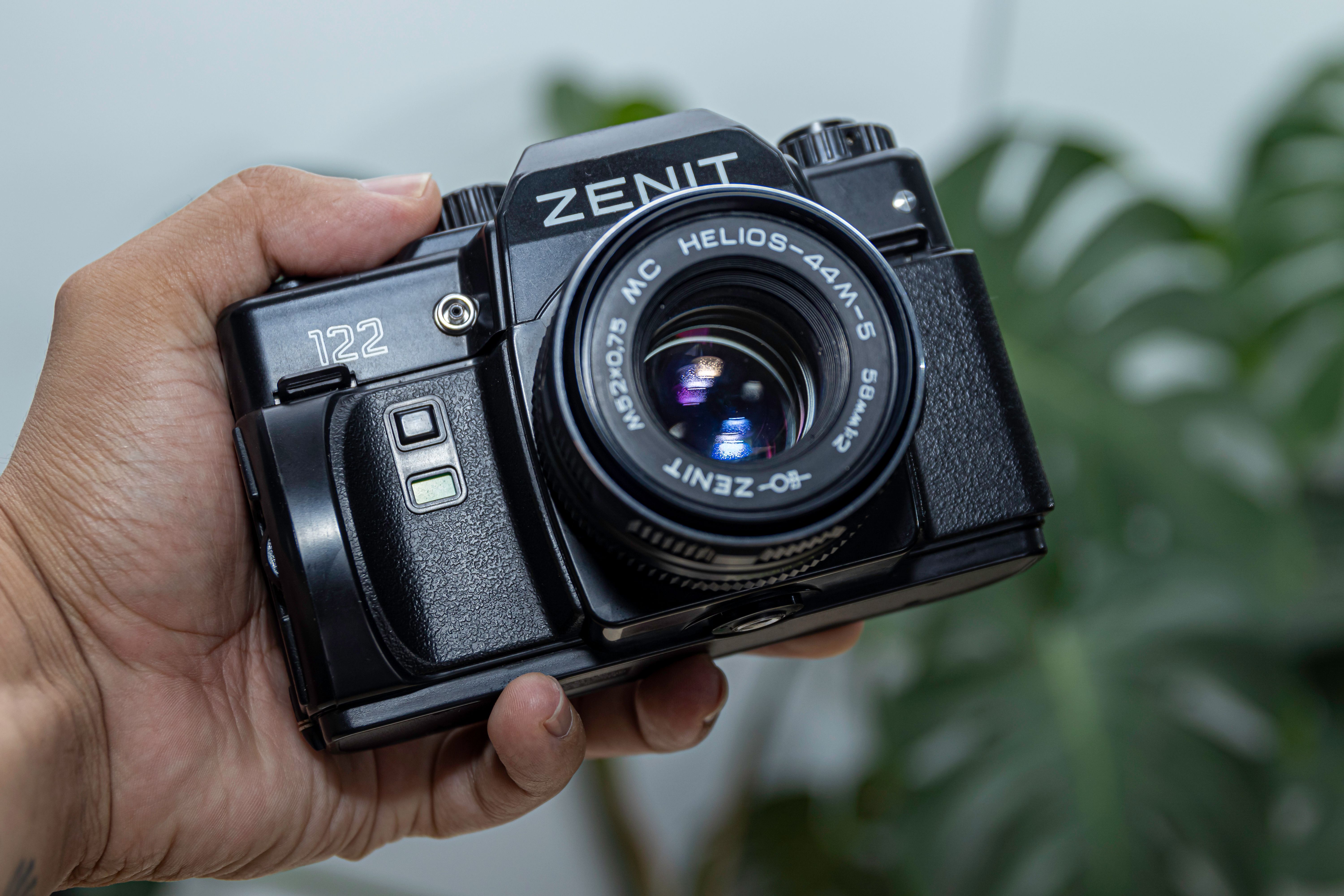 Close-up of a Zenit Film Camera in Hand · Free Stock Photo