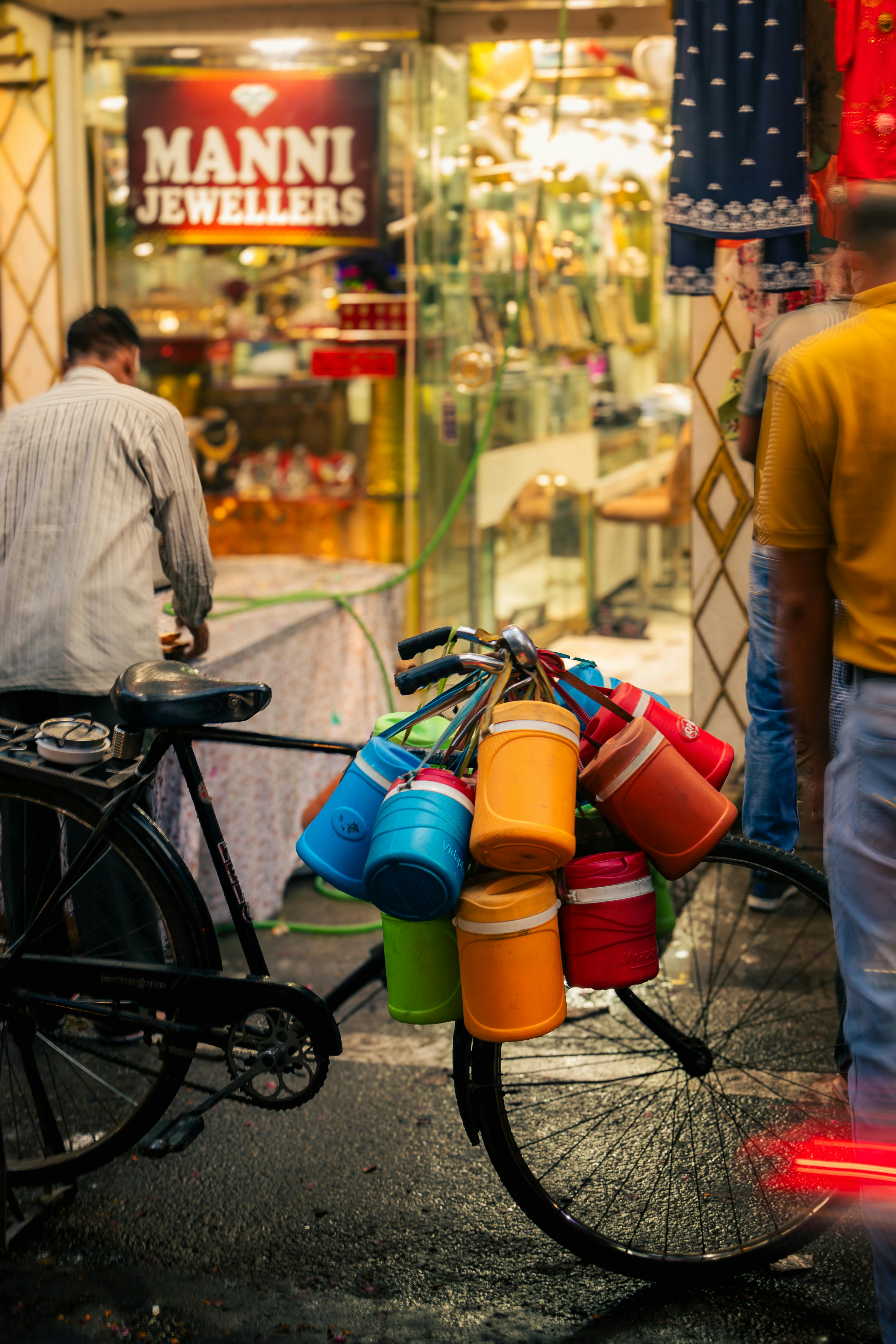 Colorful Tiffins on Bicycle in Busy Indian Street · Free Stock Photo