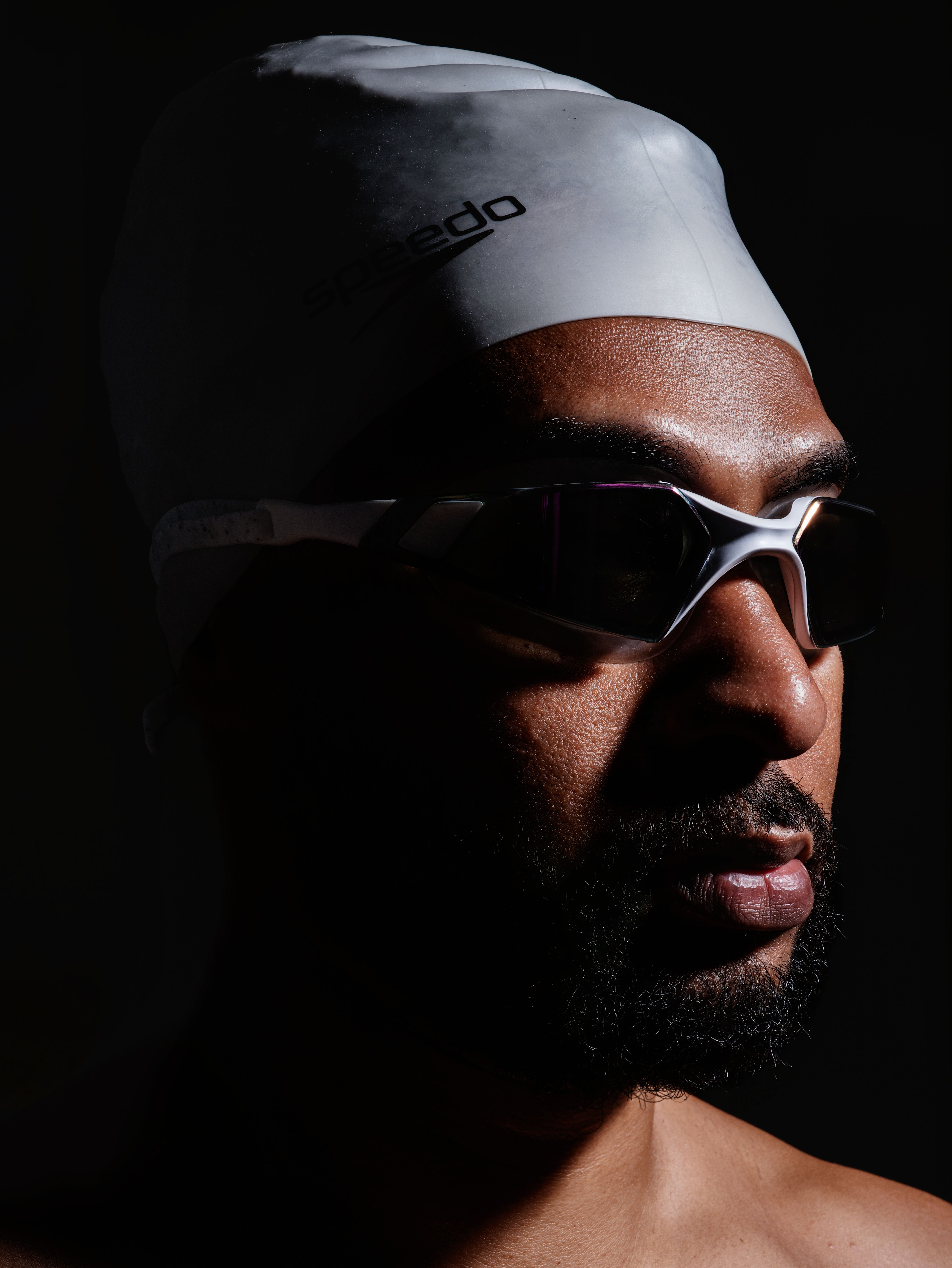 Focused Athlete in Swimwear and Goggles · Free Stock Photo
