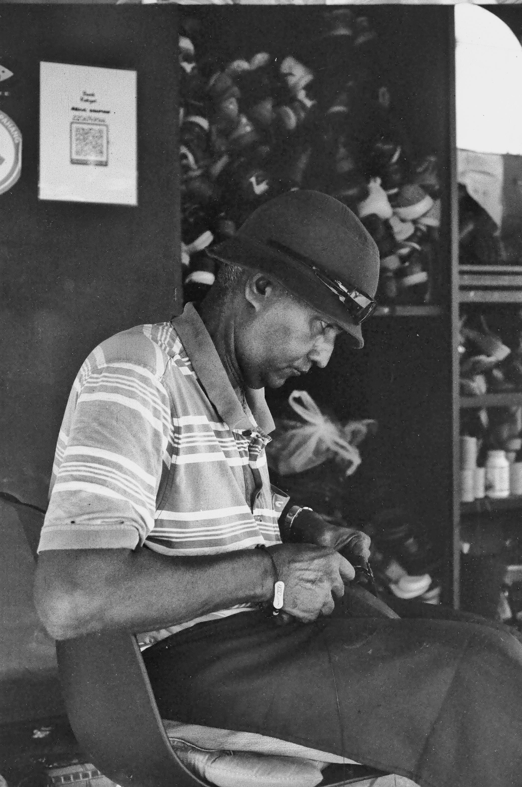Black and White Portrait of Shoemaker Crafting · Free Stock Photo