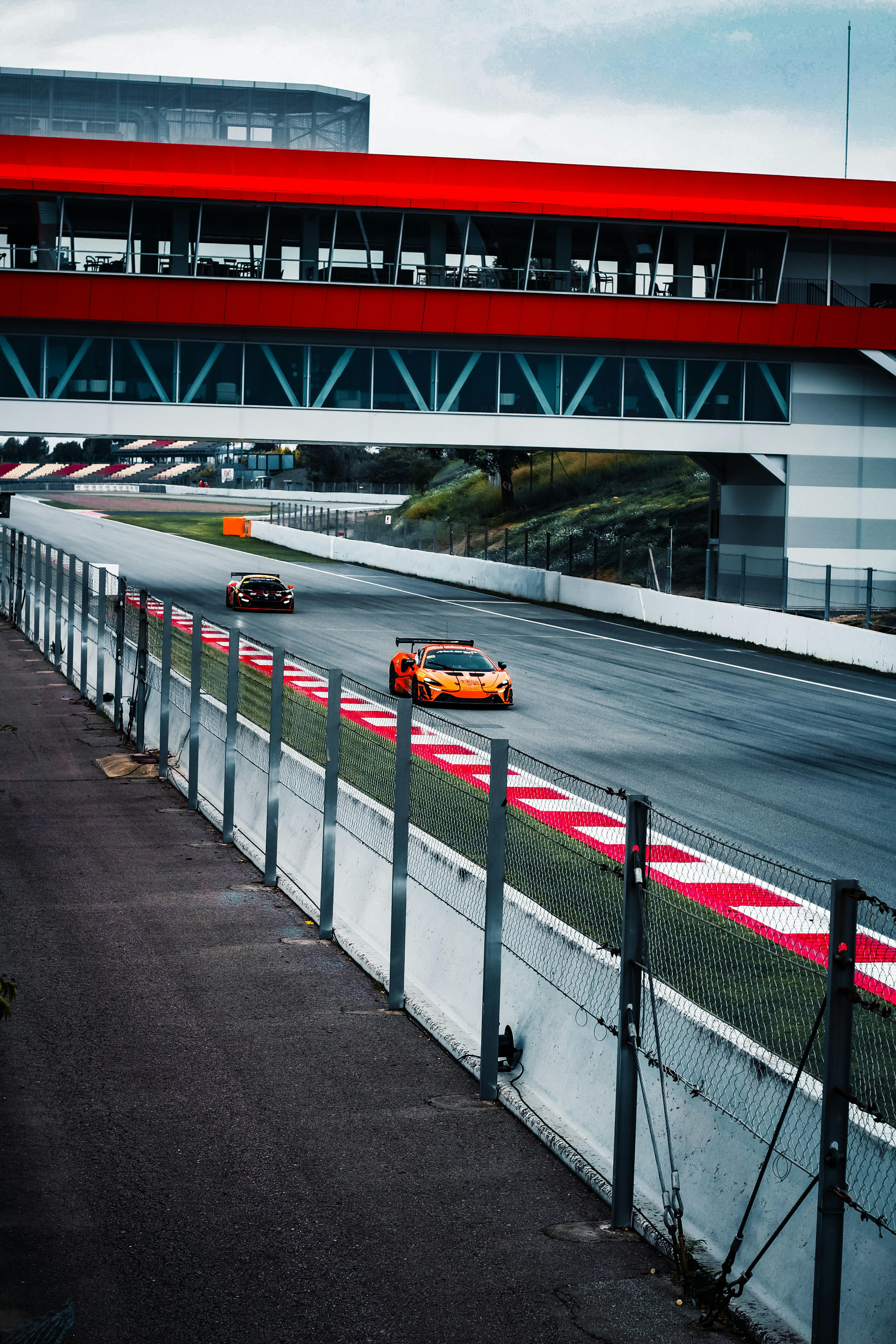 High-speed action on a professional race track · Free Stock Photo