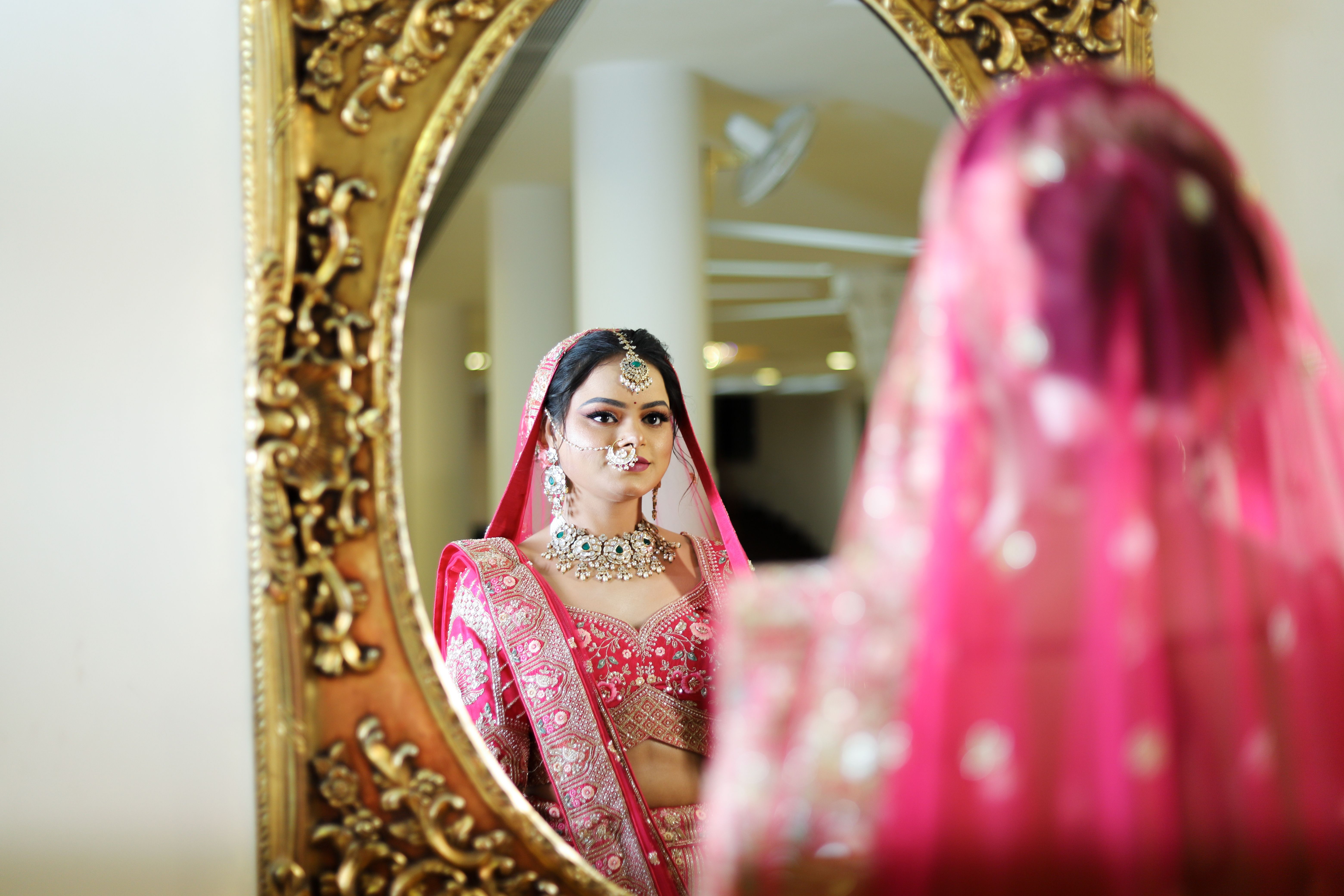 Elegant Bride in Traditional Attire Mirror Reflection · Free Stock Photo