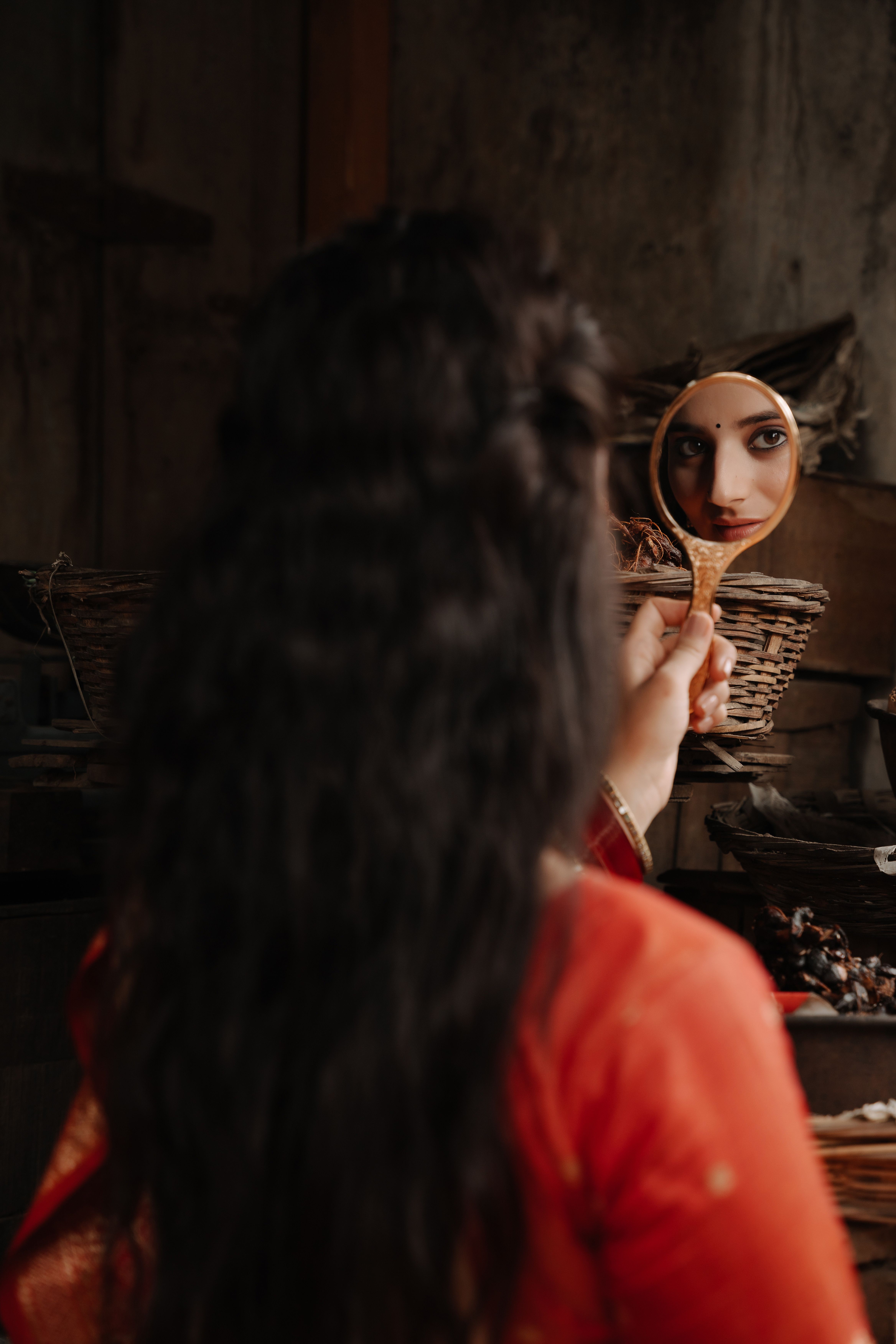 Mysterious Woman Reflected in Hand Mirror · Free Stock Photo