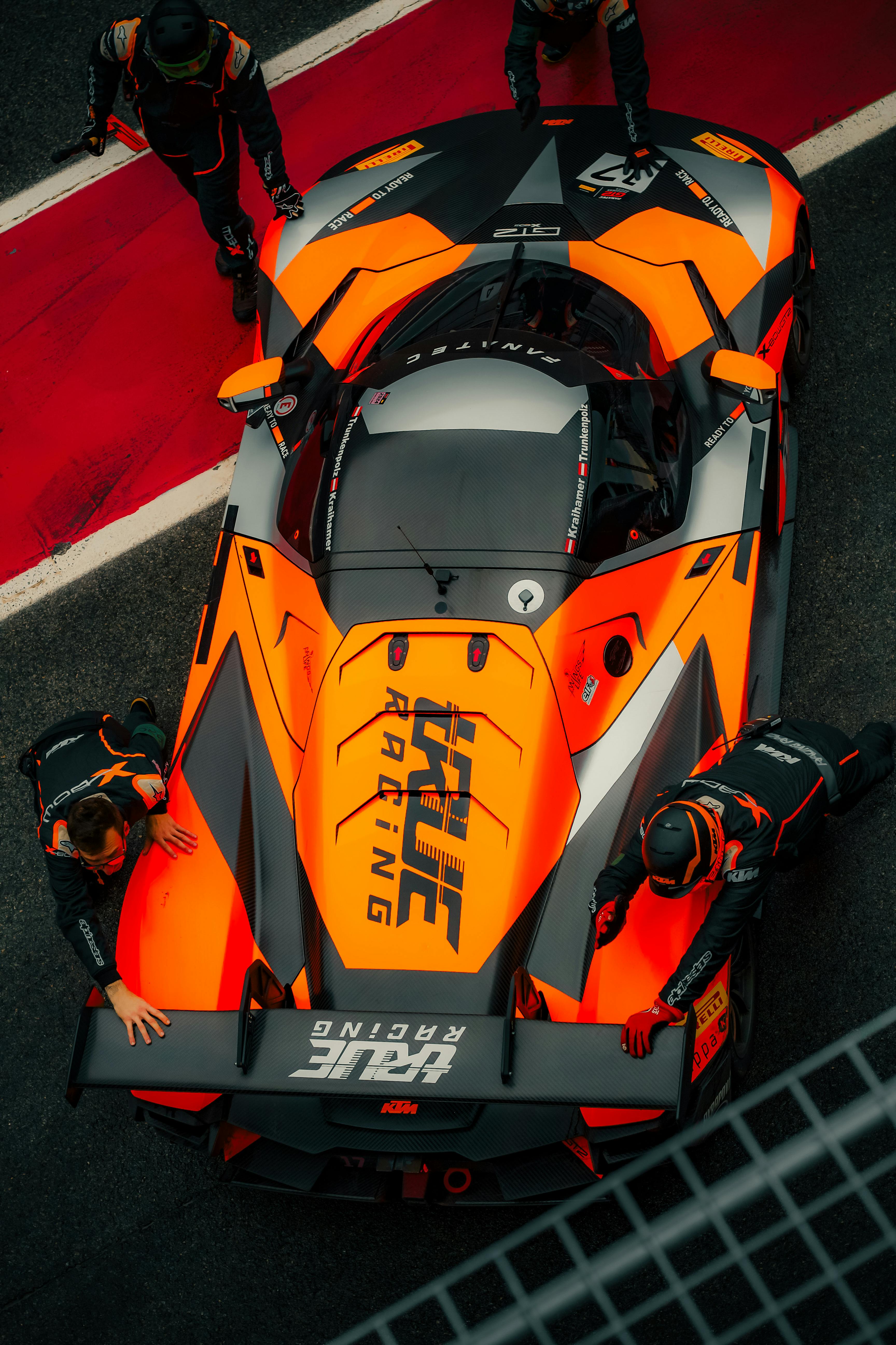 Top View of Race Car with Pit Crew at CT Speedway · Free Stock Photo