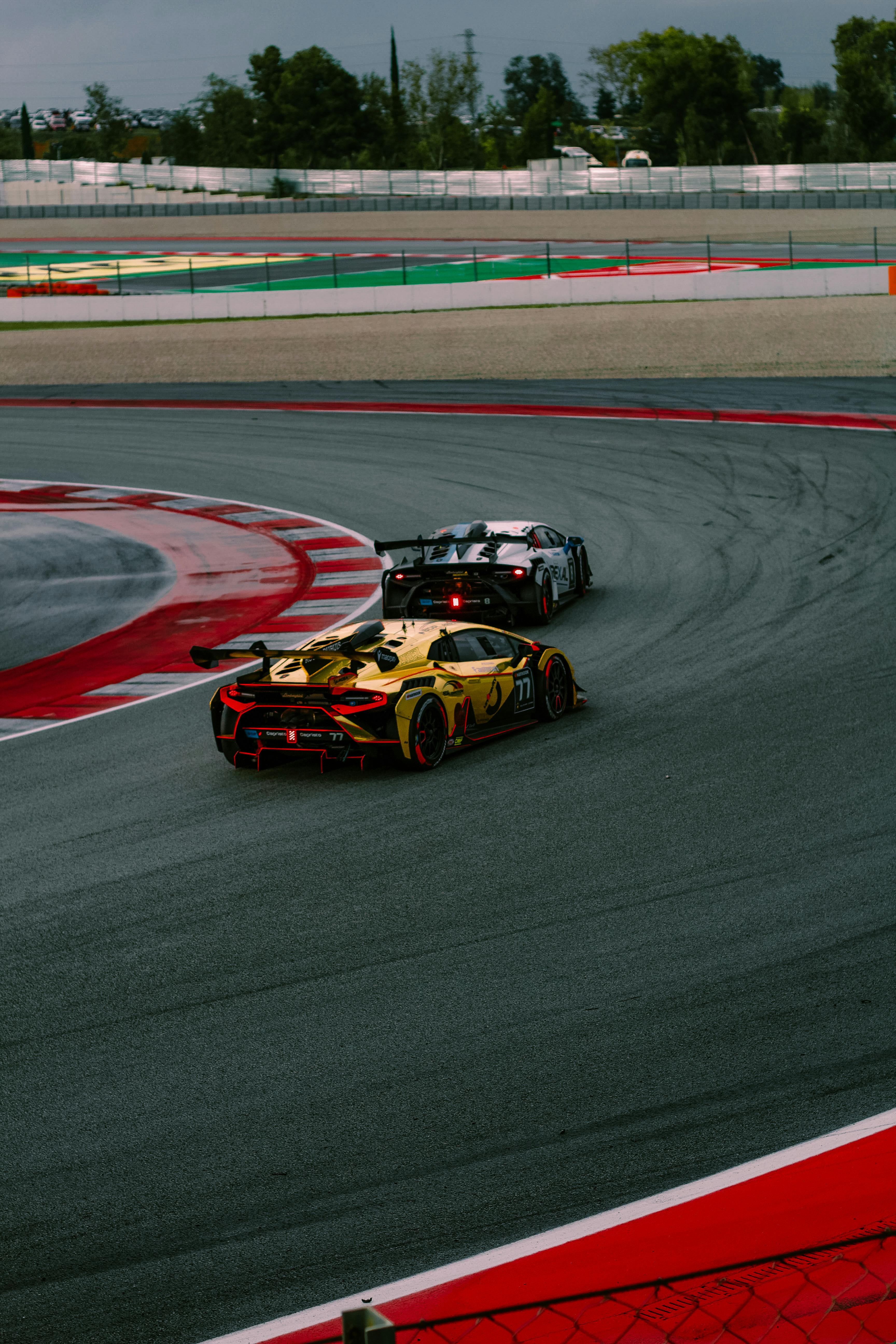 High-speed action on a professional race track · Free Stock Photo