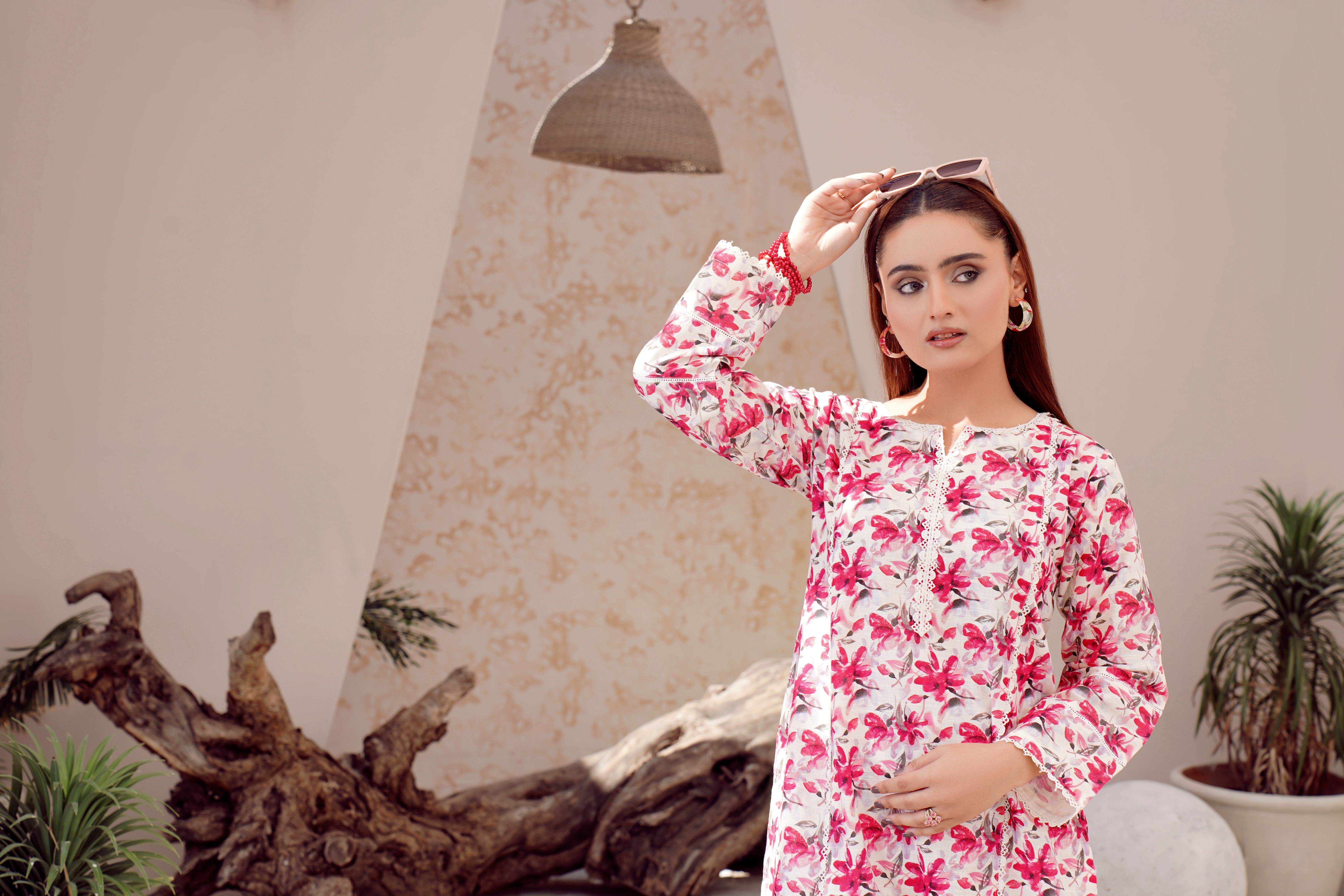 Elegant Pakistani Fashion Model in Floral Dress · Free Stock Photo