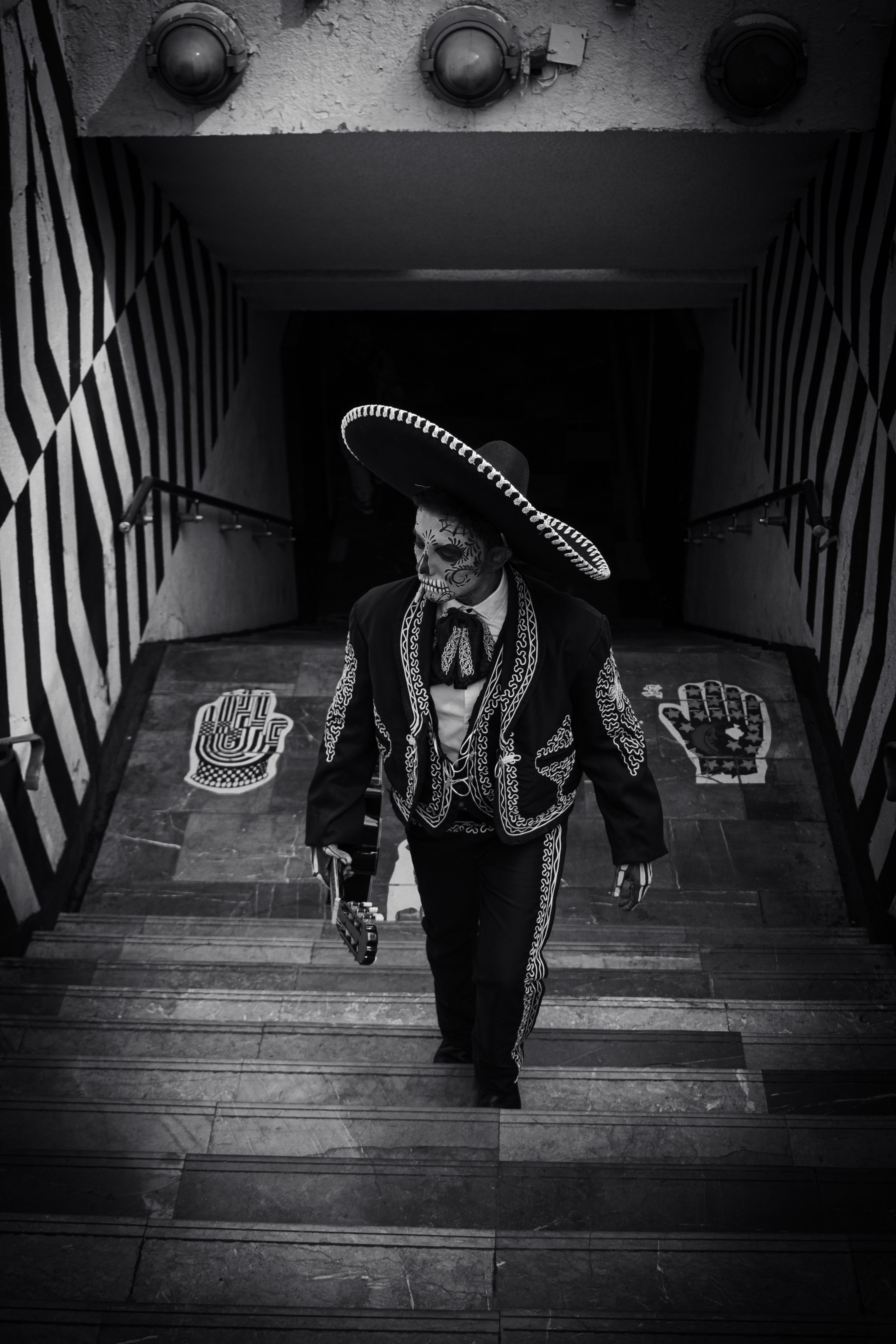 Black and White Mariachi Performer in Stairway · Free Stock Photo