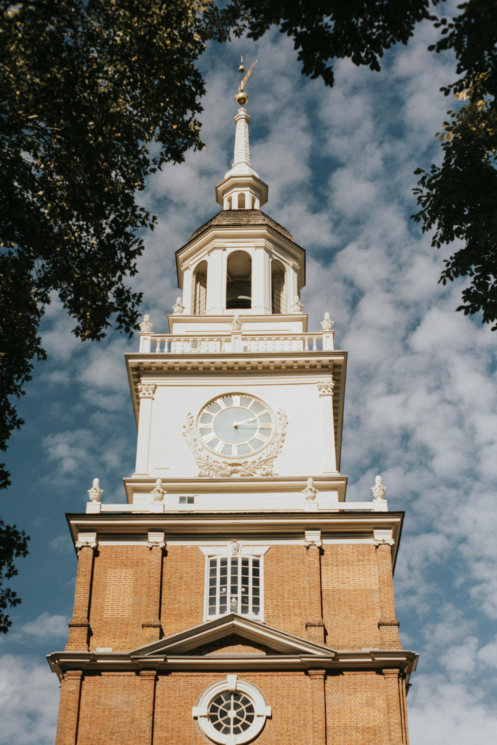 Historic Clock Tower Under Blue Sky in Philadelphia · Free Stock Photo