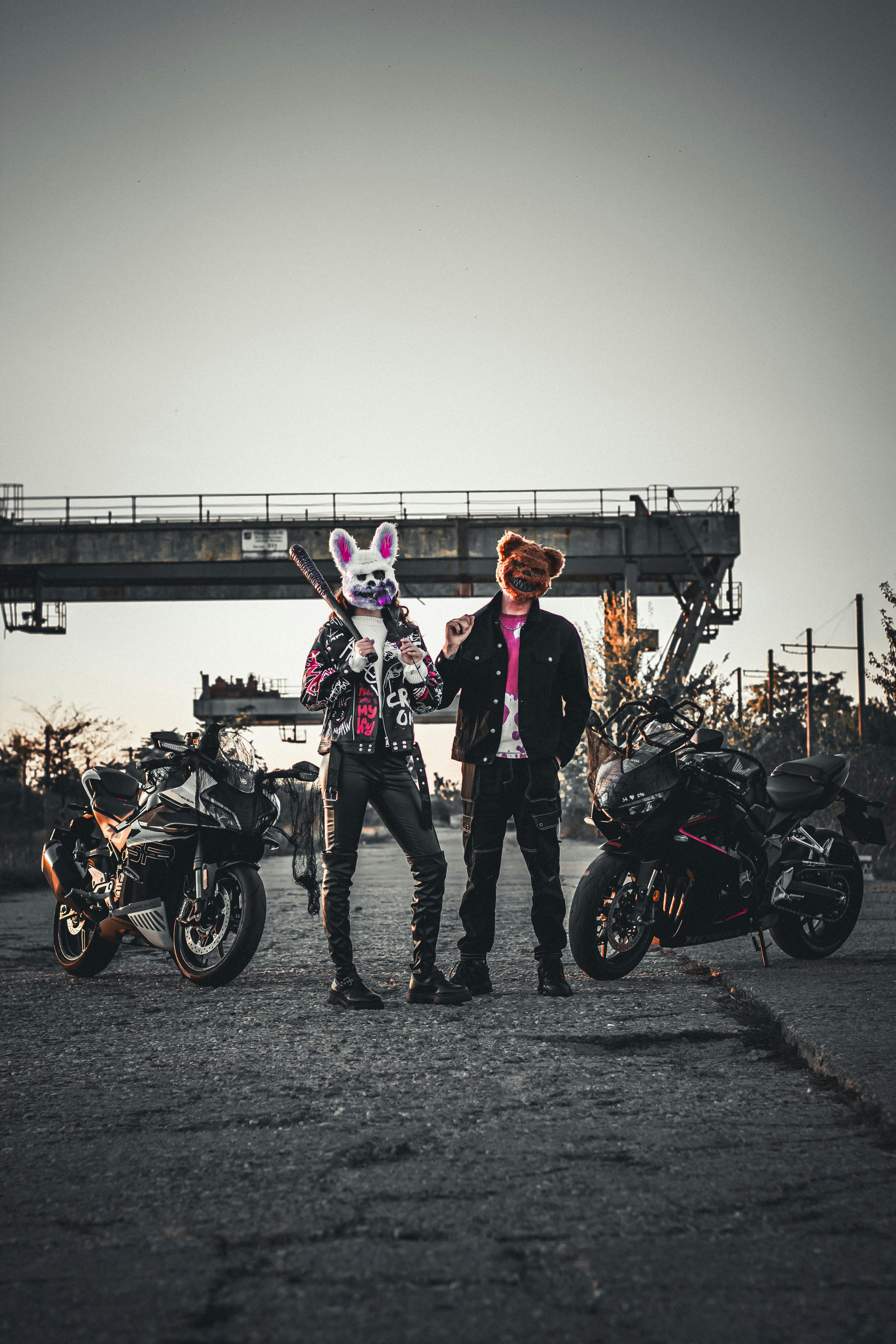 Masked Bikers with Motorcycles in Urban Setting · Free Stock Photo