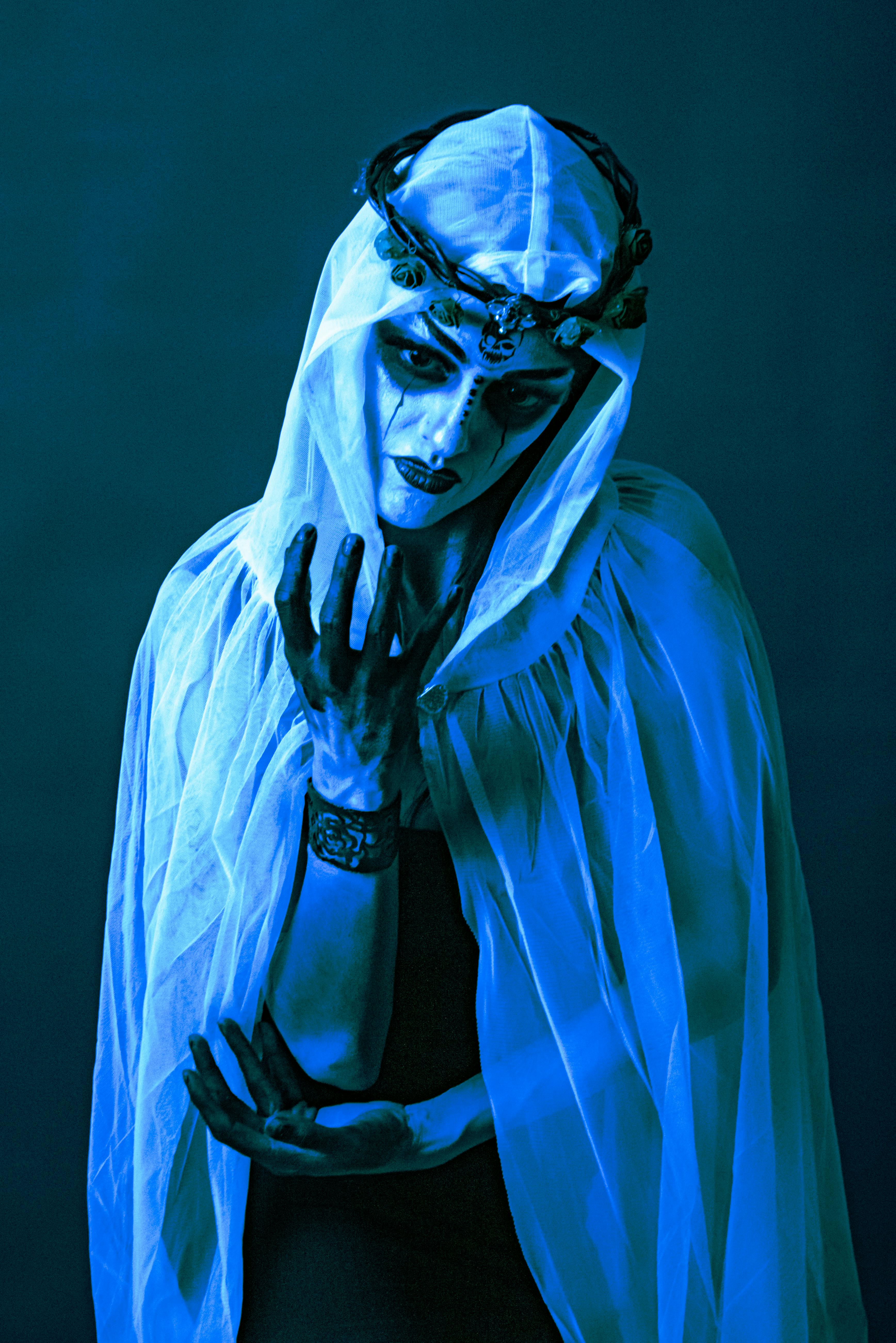 Stylized Horror Portrait with Blue Ghostly Makeup · Free Stock Photo