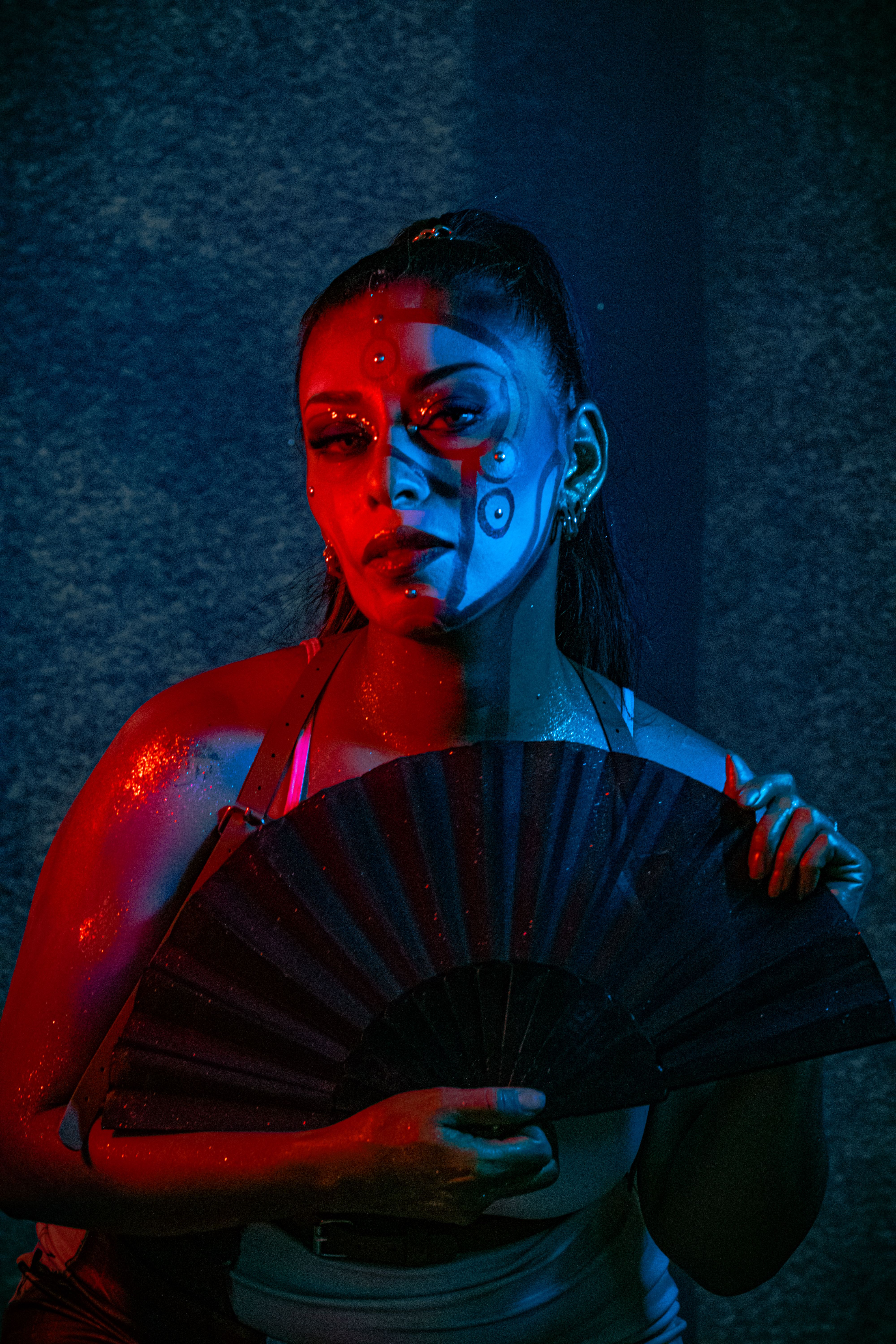 Artistic Horror Makeup Portrait in Colored Lights · Free Stock Photo