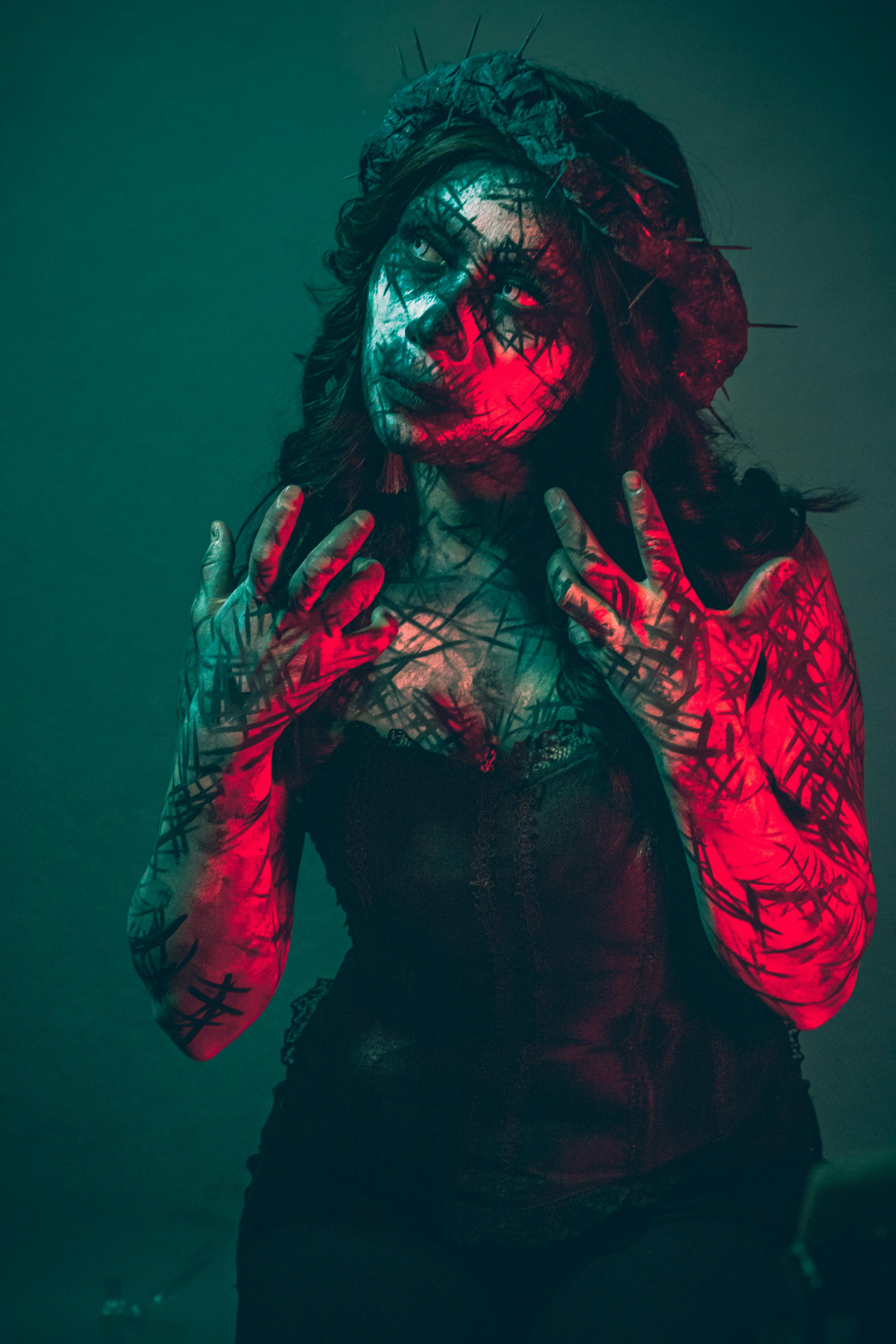 Dramatic Horror Portrait in Red and Green Light · Free Stock Photo