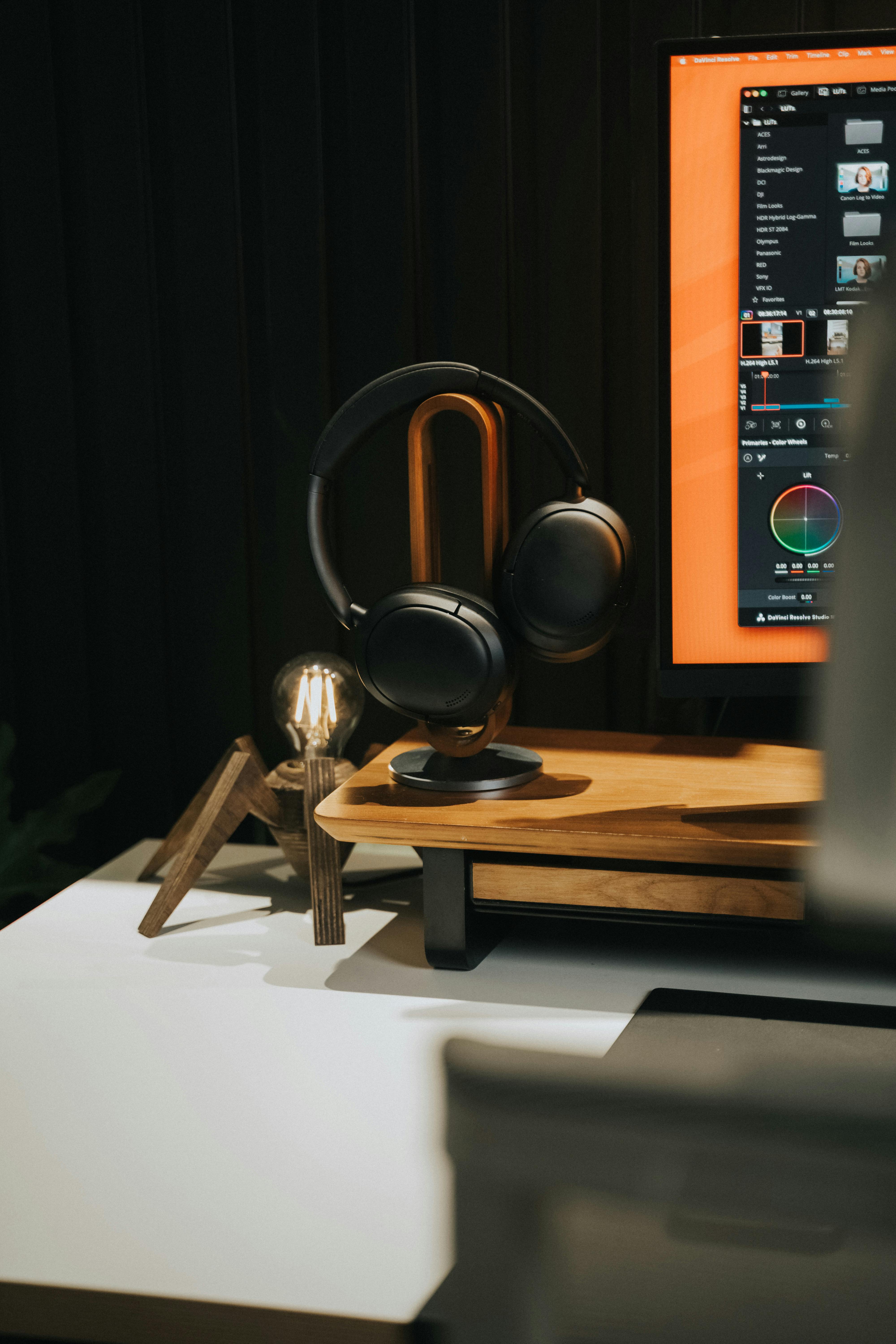 Elegant Desk Setup with Headphones and Monitor · Free Stock Photo