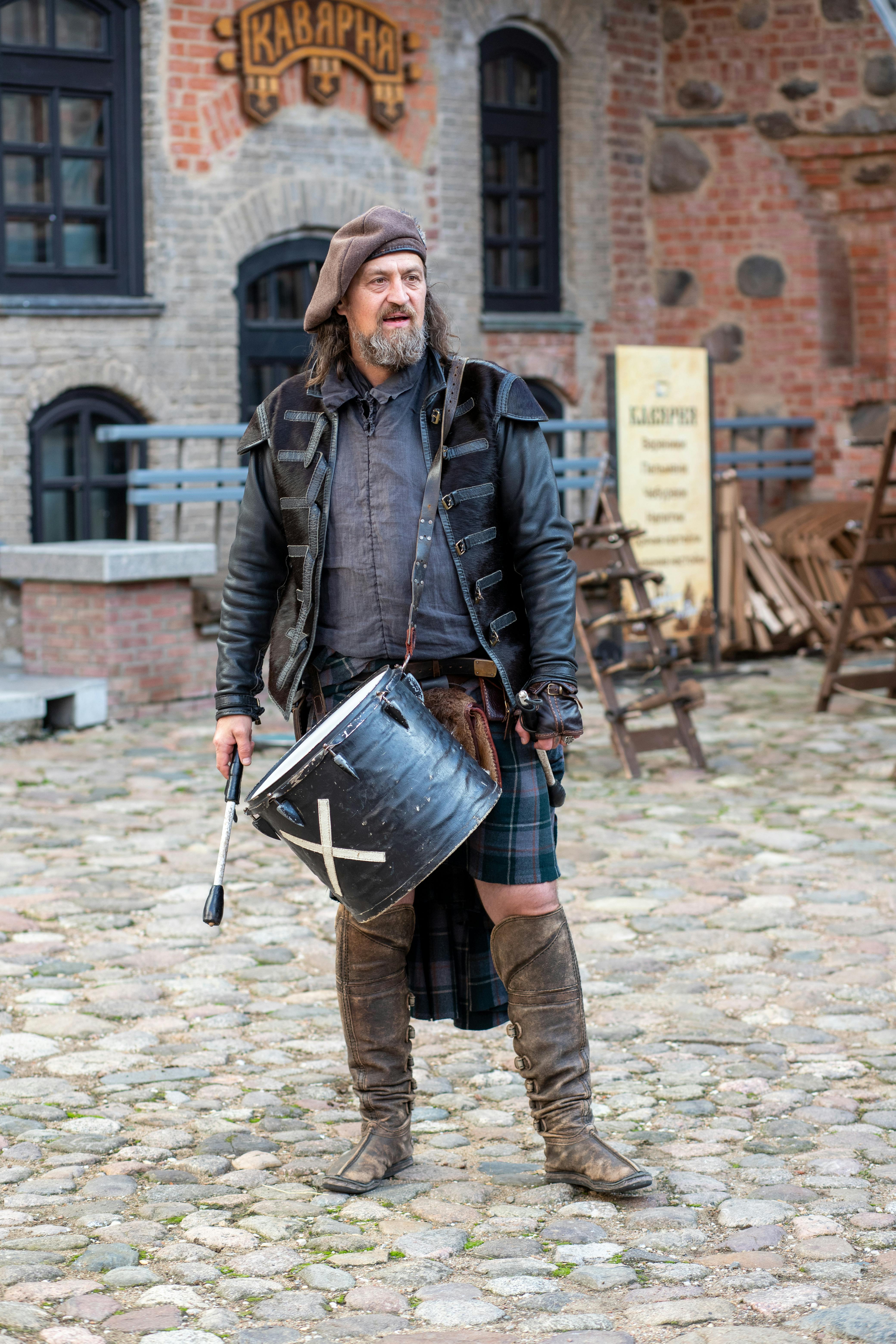 Medieval Drummer in Traditional Costume · Free Stock Photo