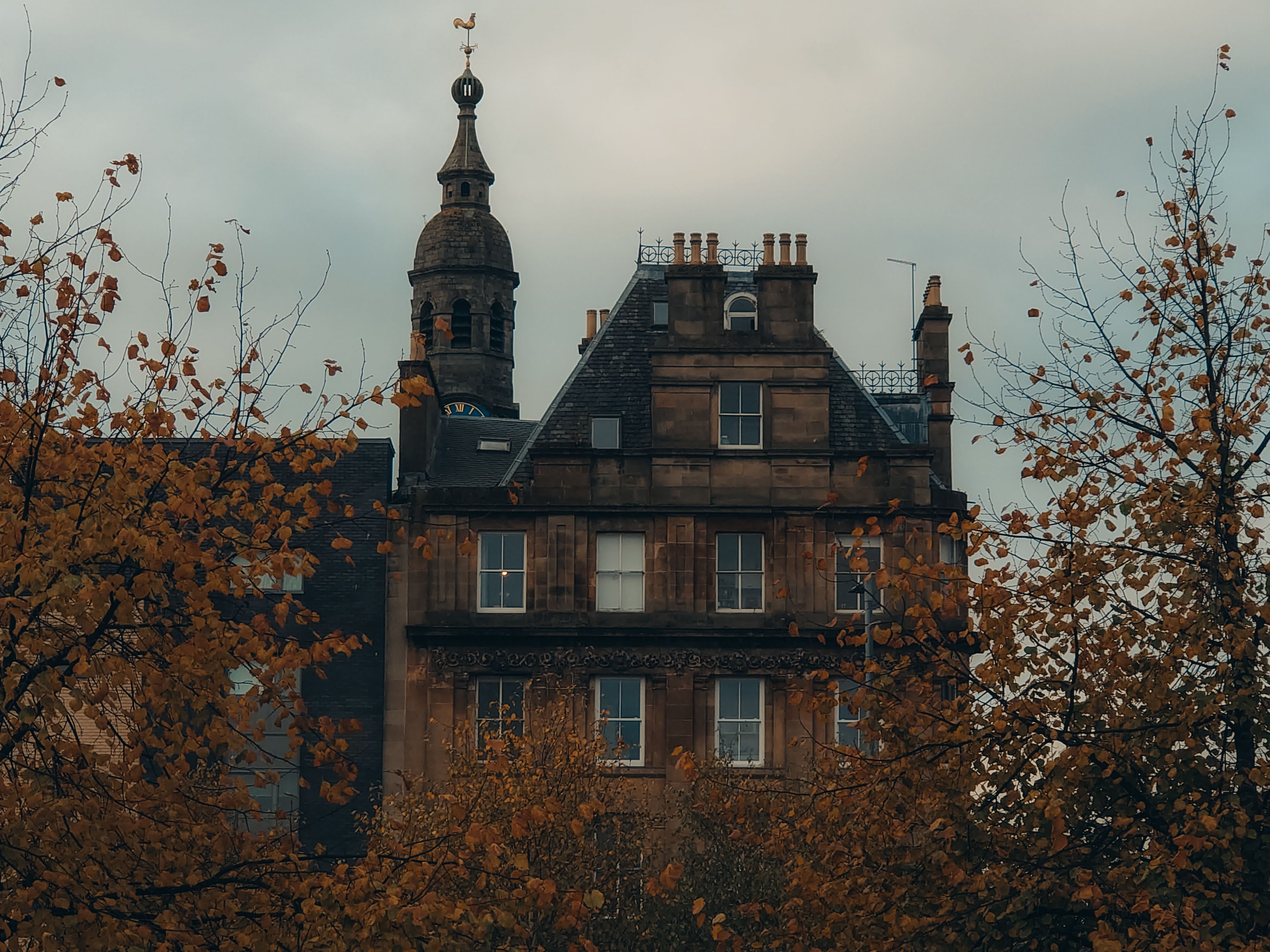 Historic Building Surrounded by Autumn Foliage · Free Stock Photo