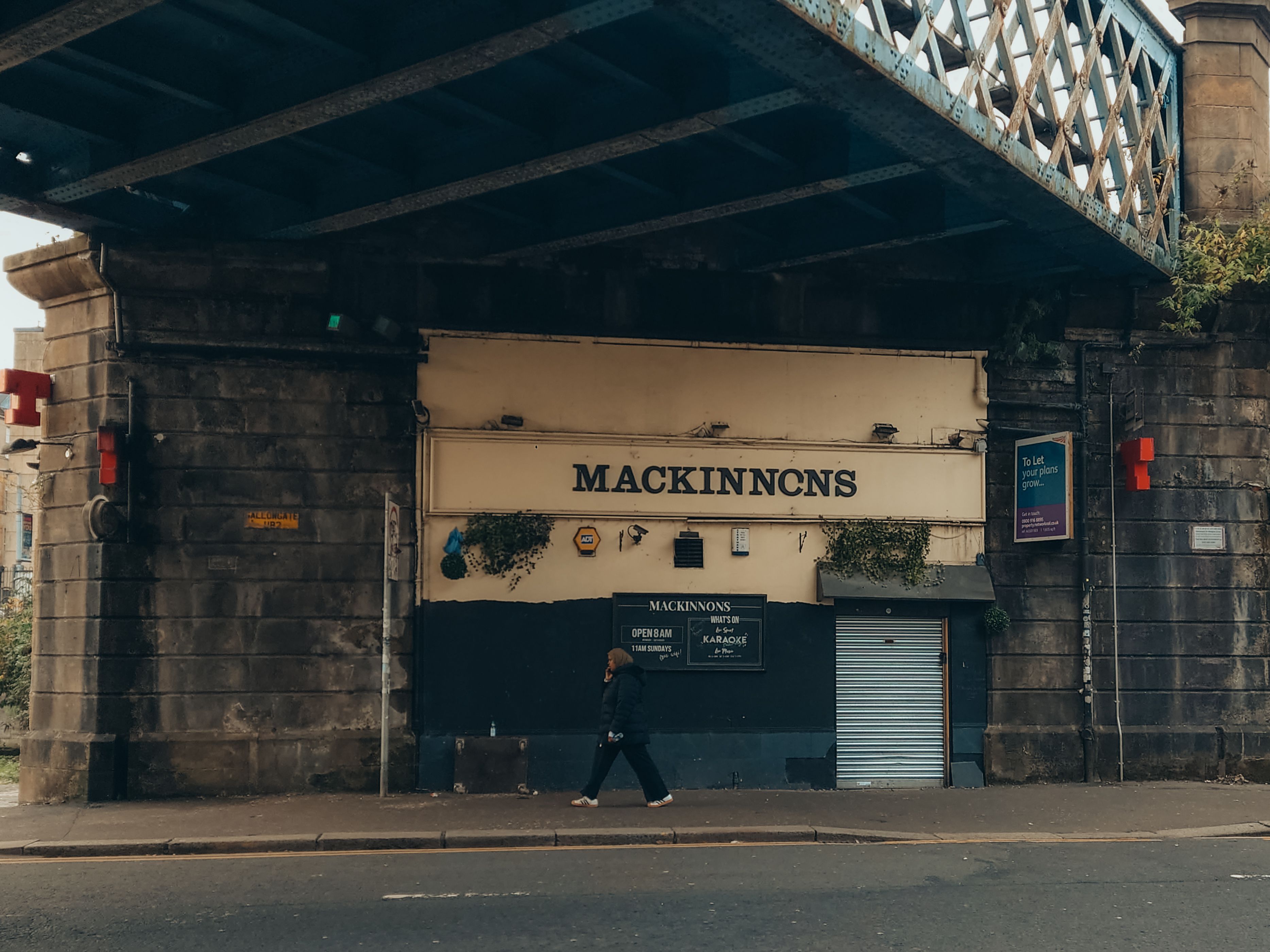 Street View of Mackinnons Under Railway Bridge · Free Stock Photo