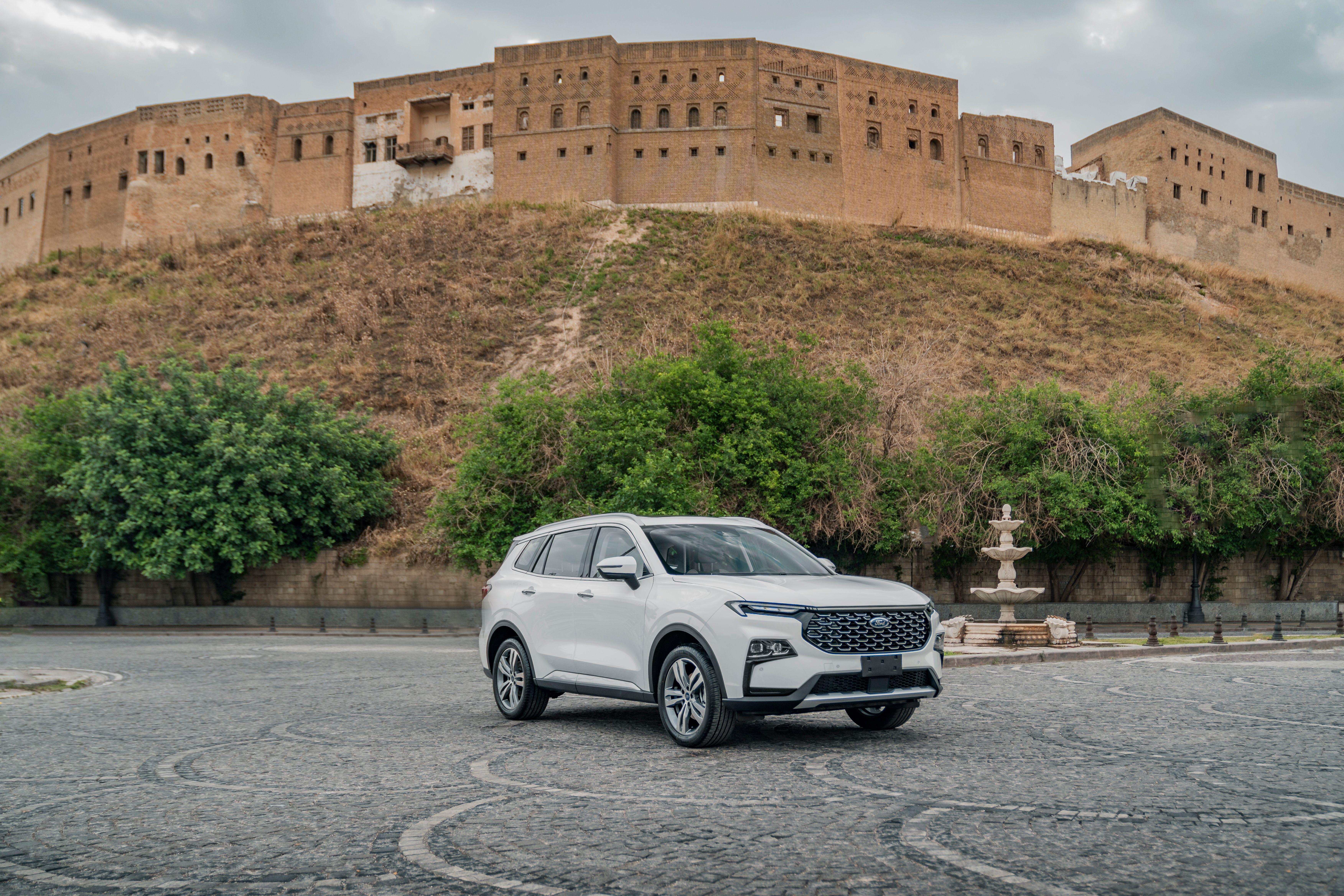 Modern SUV in front of Erbil Citadel, Iraq · Free Stock Photo