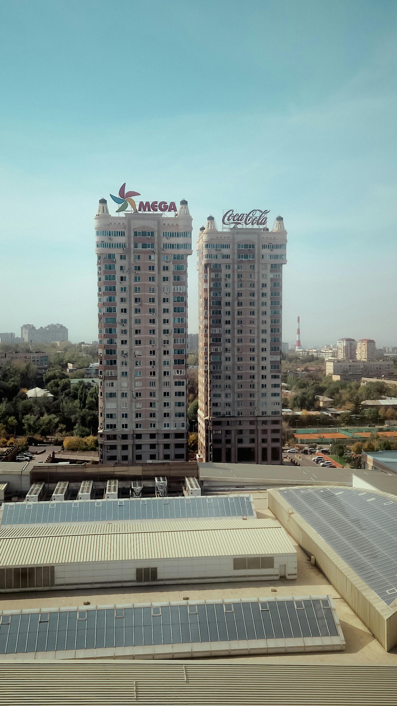 Mega and Coca-Cola Towers in Almaty Skyline · Free Stock Photo