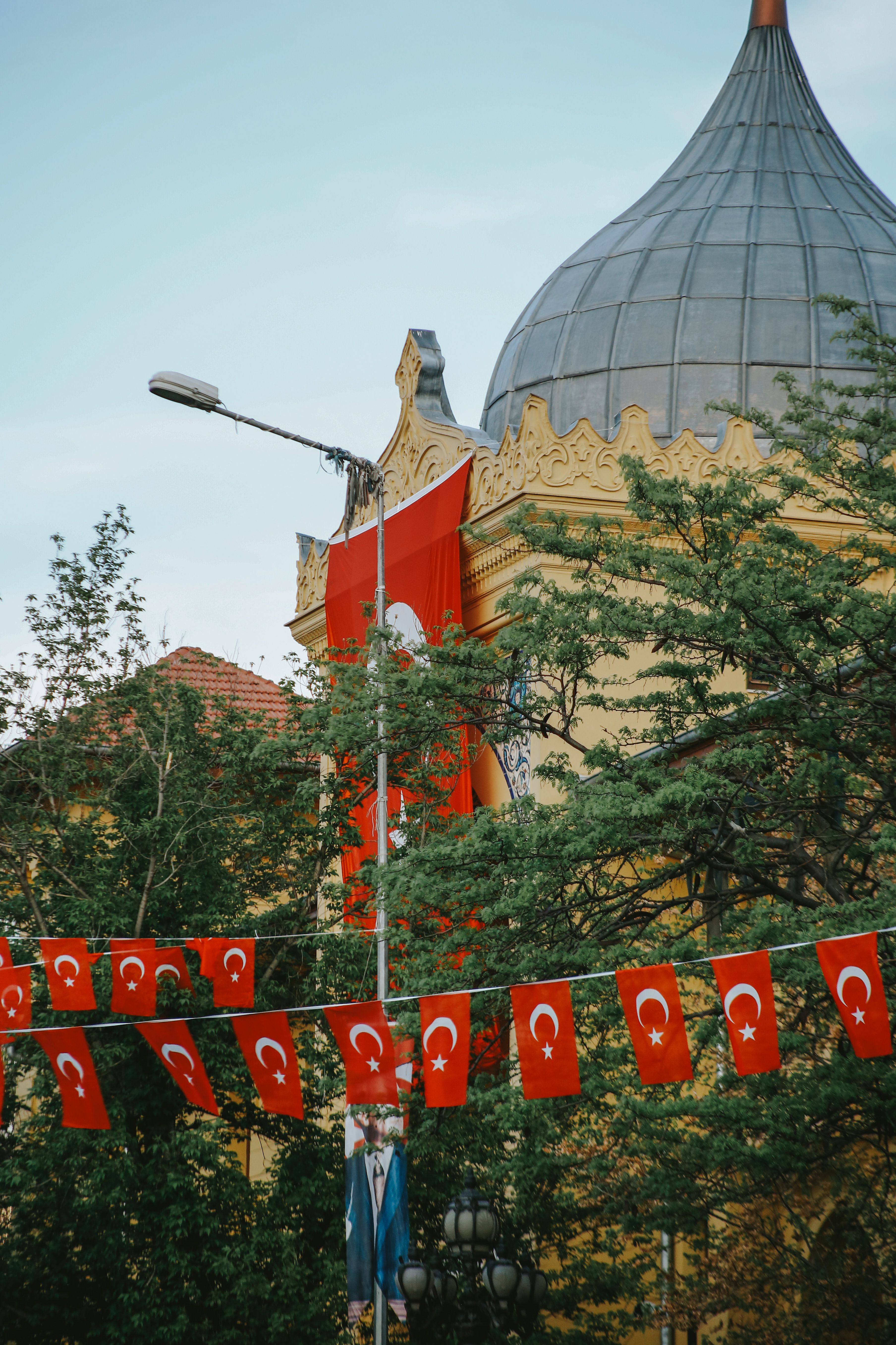 Turkish National Flags Adorning Historic Building · Free Stock Photo