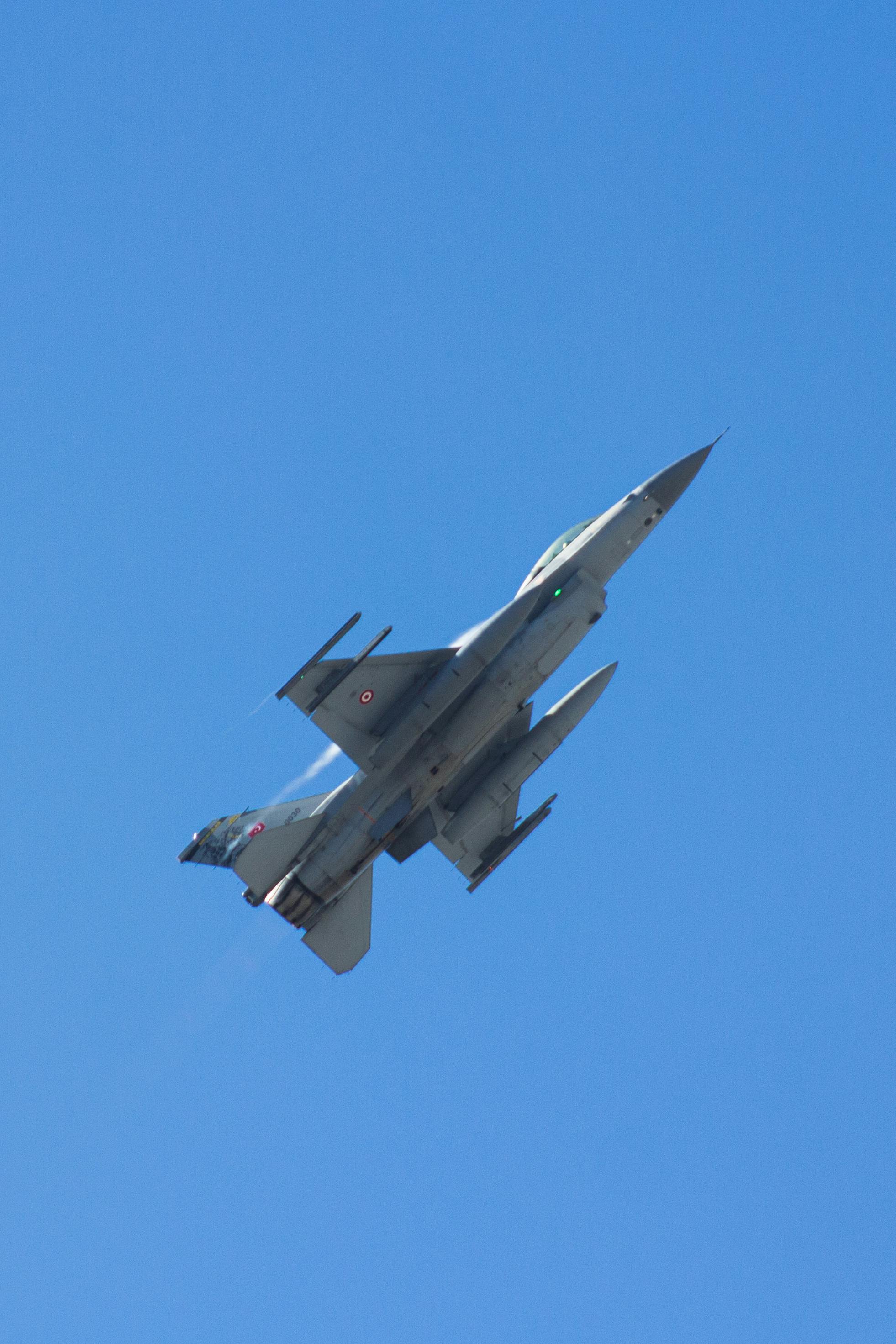 Fighter Jet Performing Stunt in Blue Skies · Free Stock Photo