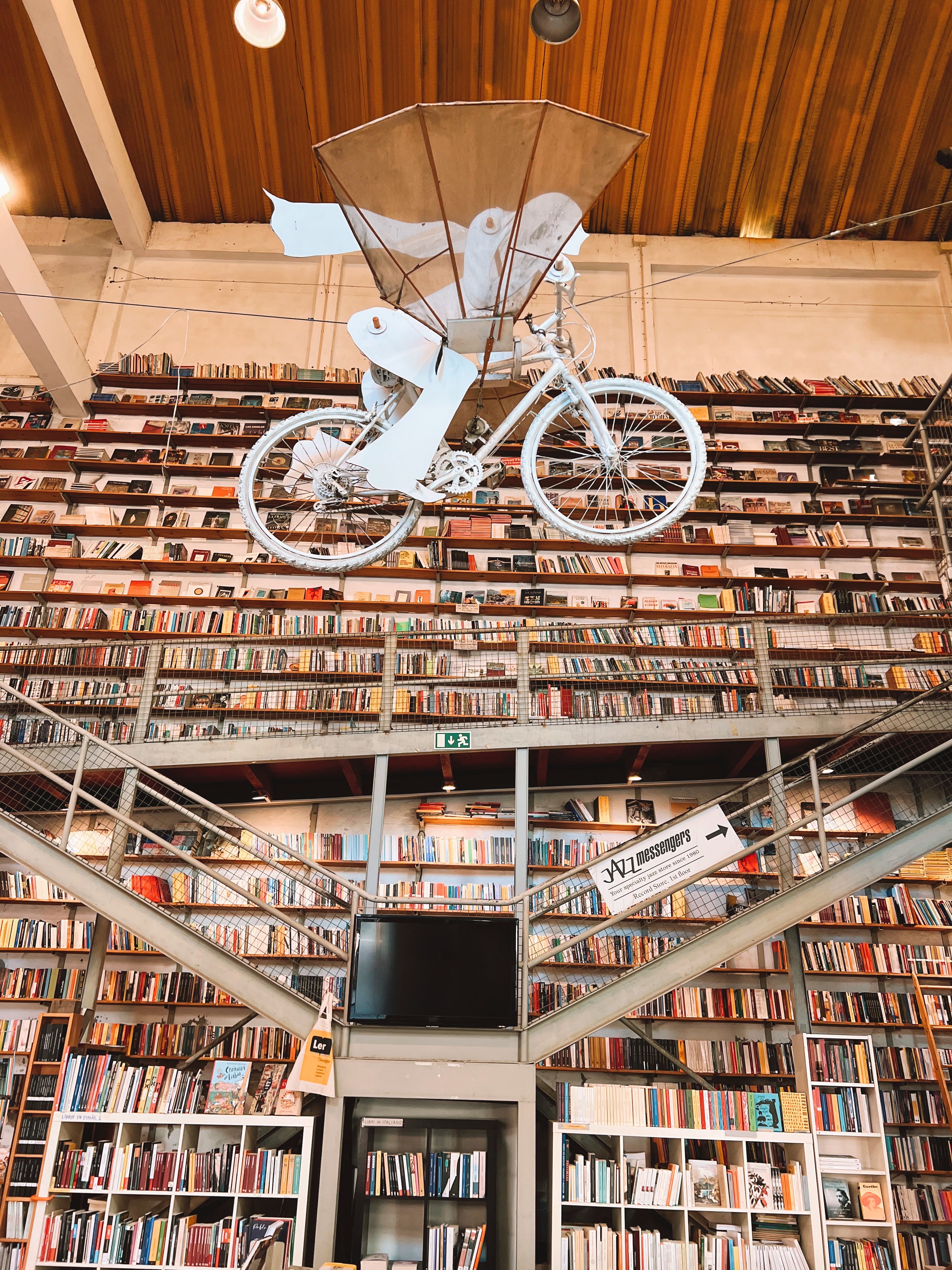 Unique Interior of a Modern Library with Bicycle Art · Free Stock Photo