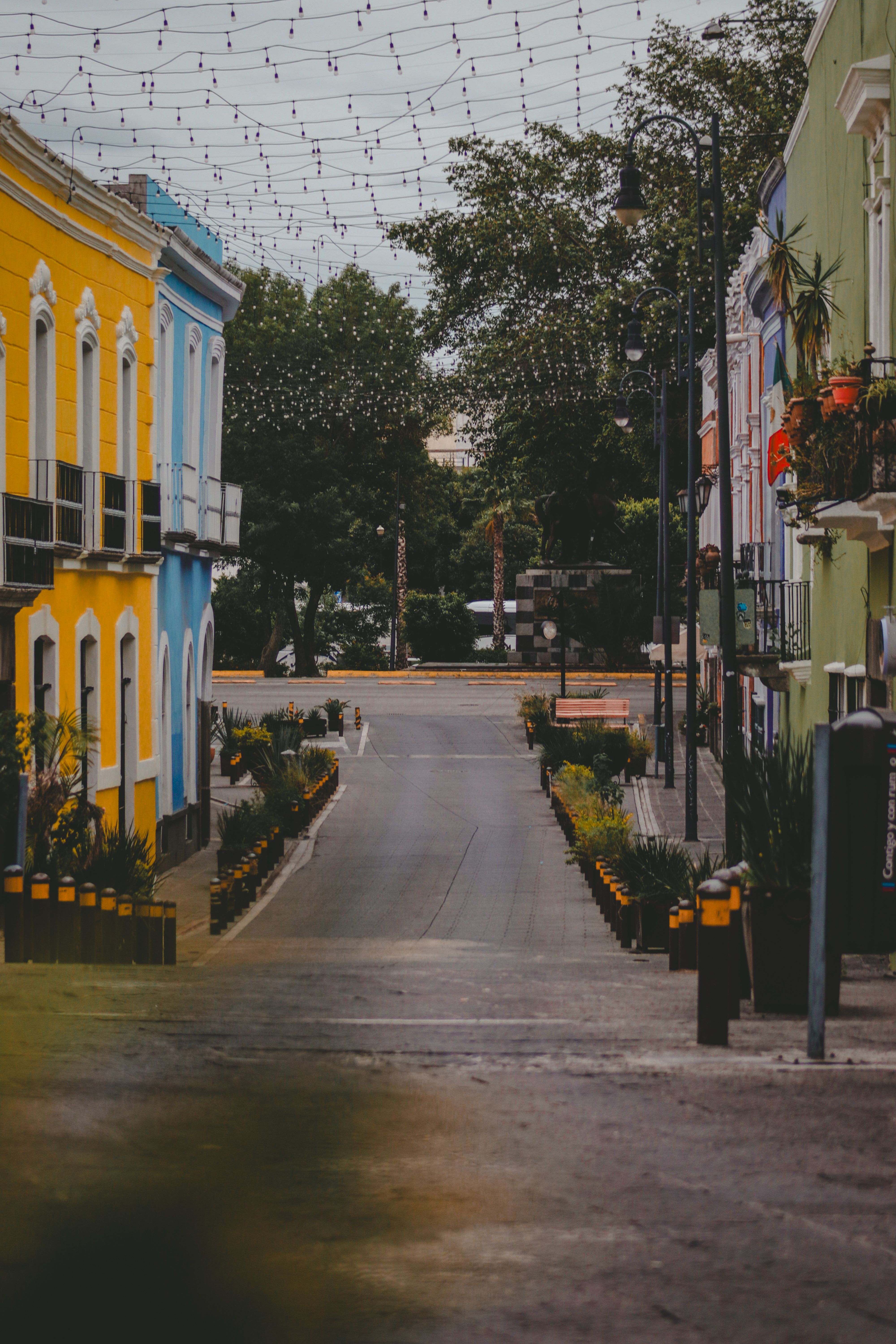 Charming Colorful Street with Hanging Lights · Free Stock Photo