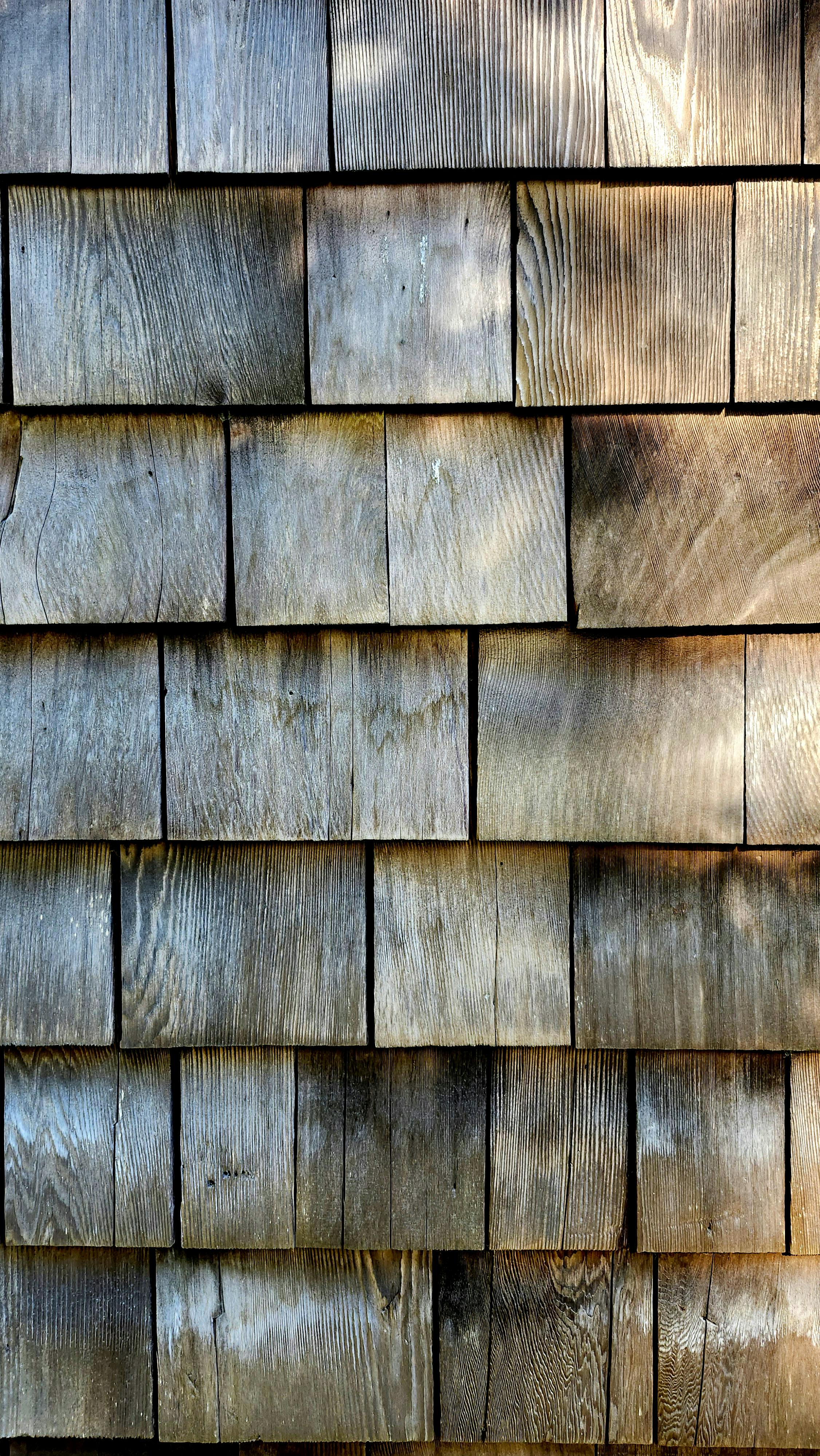 Rustic Wooden Shingles with Sunlit Texture · Free Stock Photo