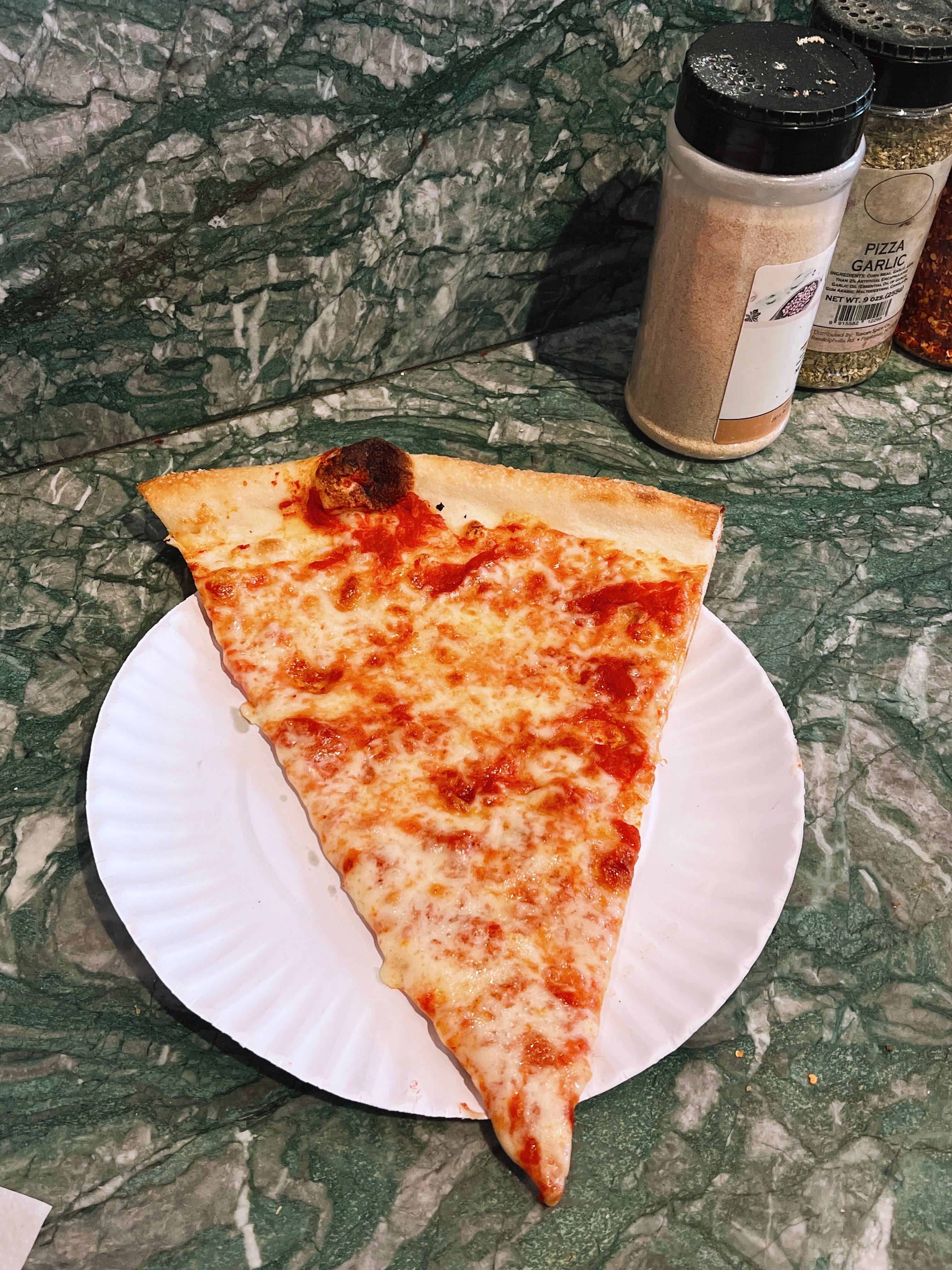 Classic Cheese Pizza Slice on Marble Counter · Free Stock Photo