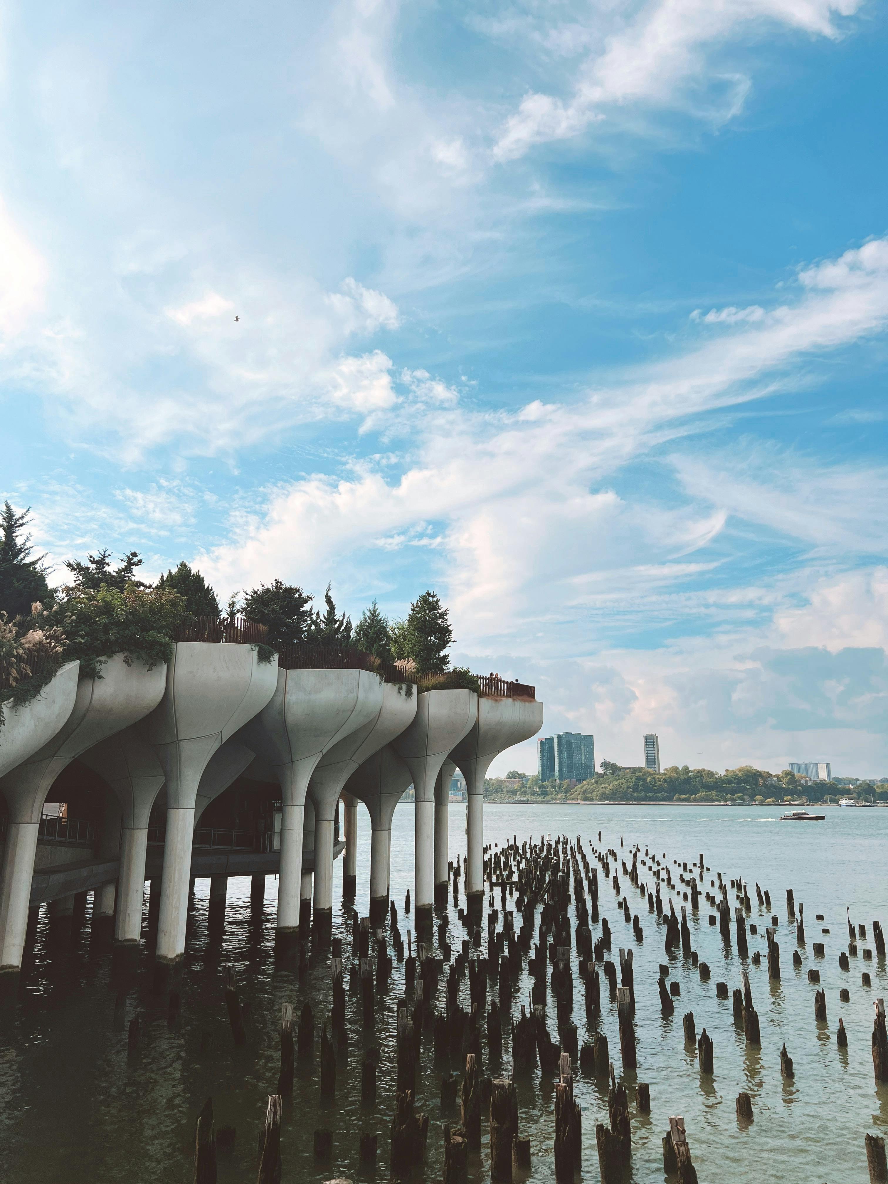 Beautiful View of Modern Pier Architecture by Water · Free Stock Photo