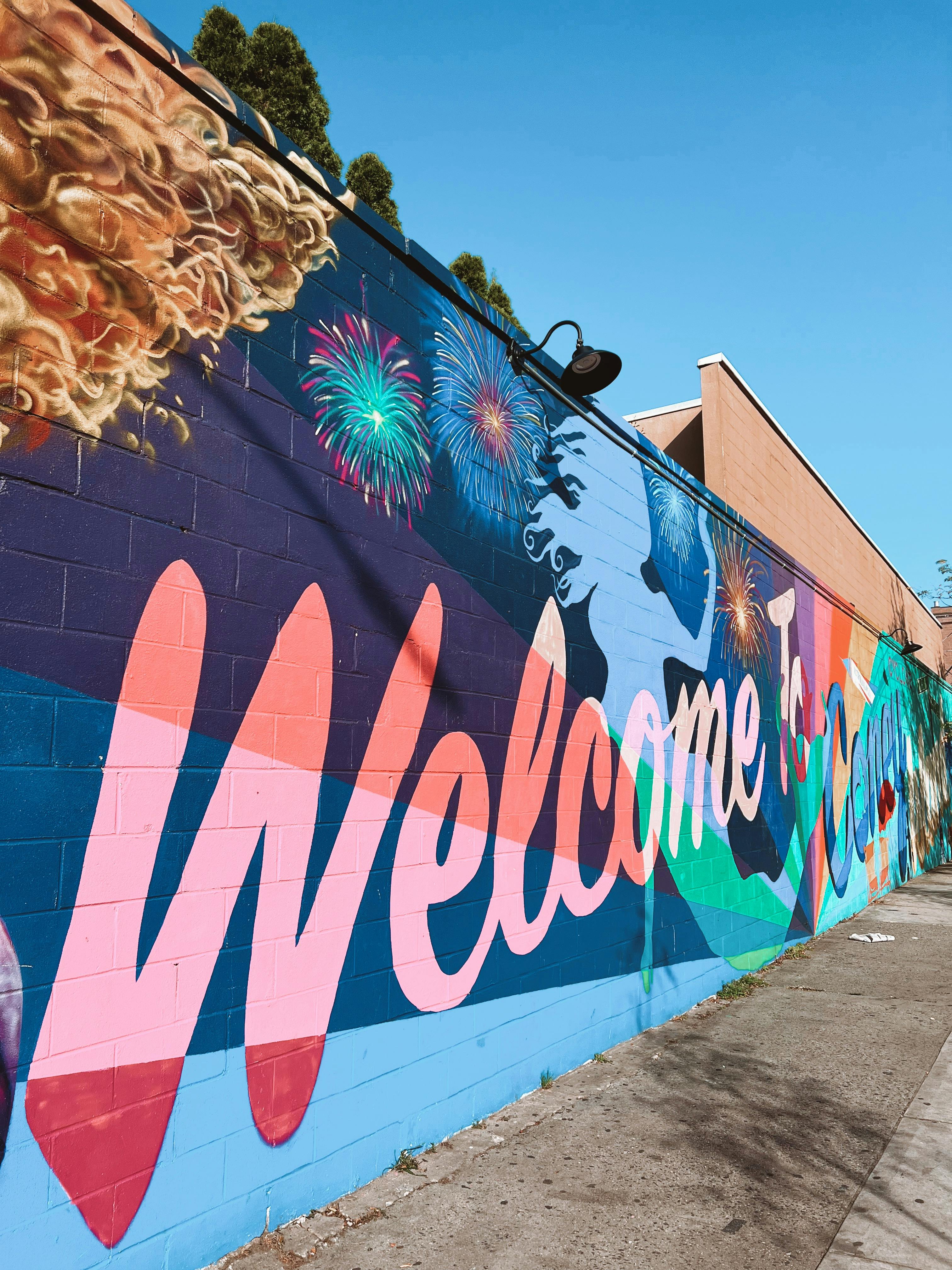 Colorful Welcome Mural with Fireworks Art · Free Stock Photo