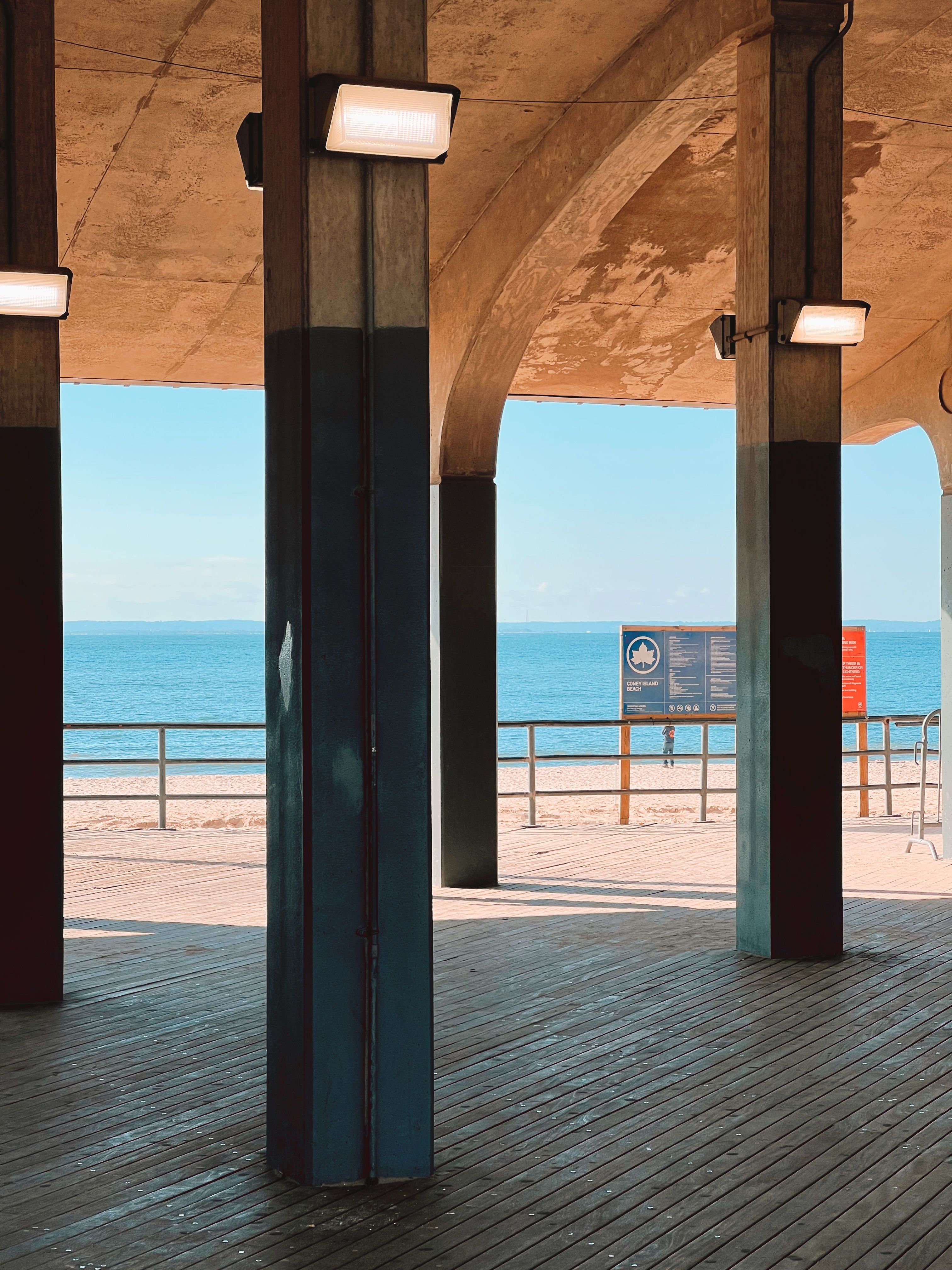Sunny Pier View Overlooking Ocean Waters · Free Stock Photo