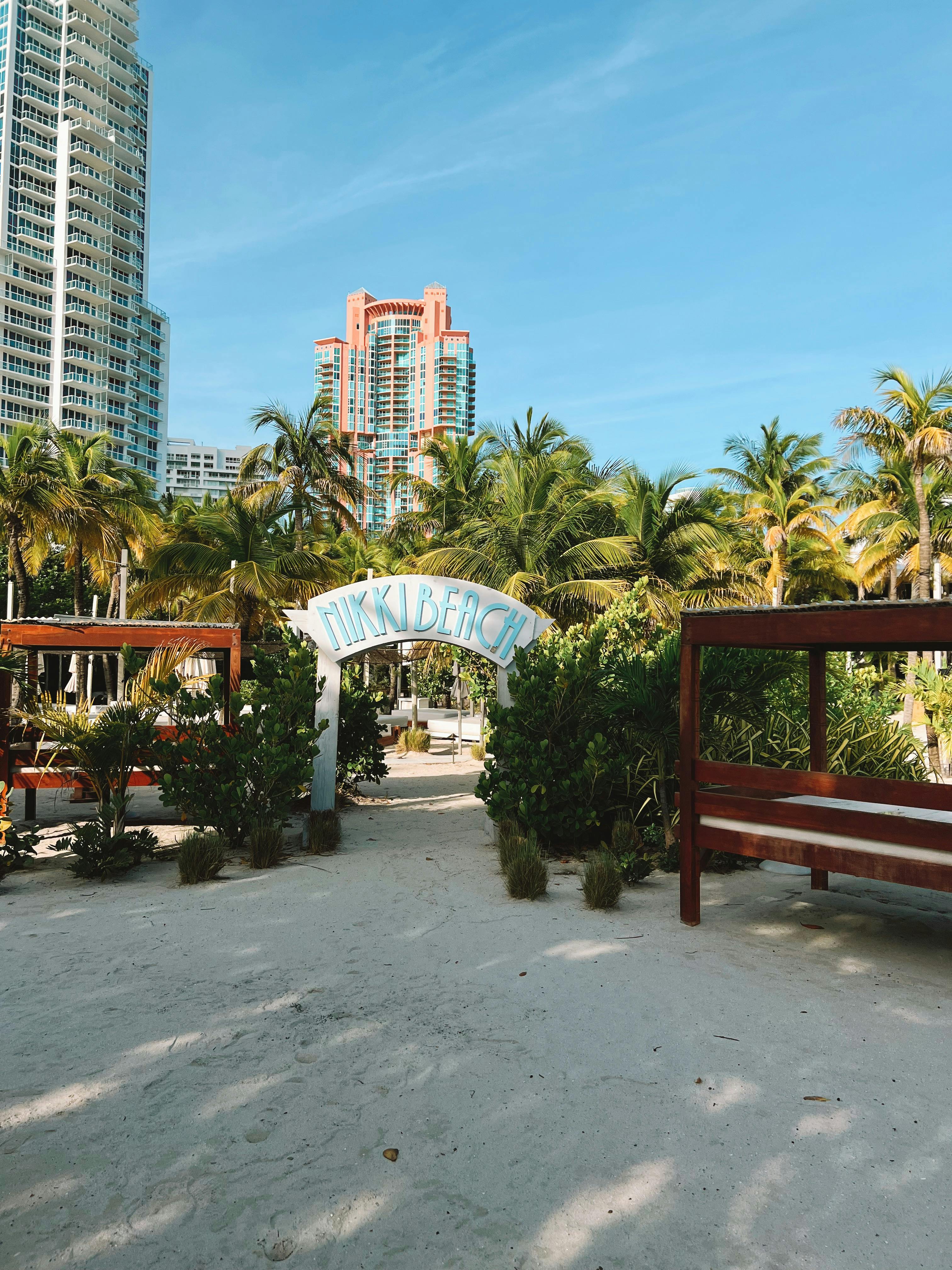 Entrance to Tropical Tiki Beach in Urban Setting · Free Stock Photo