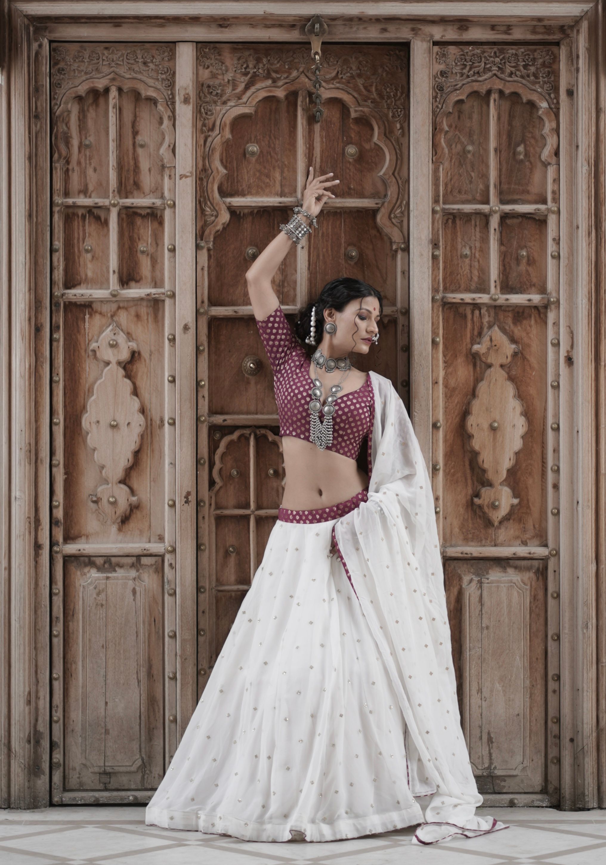 Traditional Dance Pose in Ornate Setting · Free Stock Photo