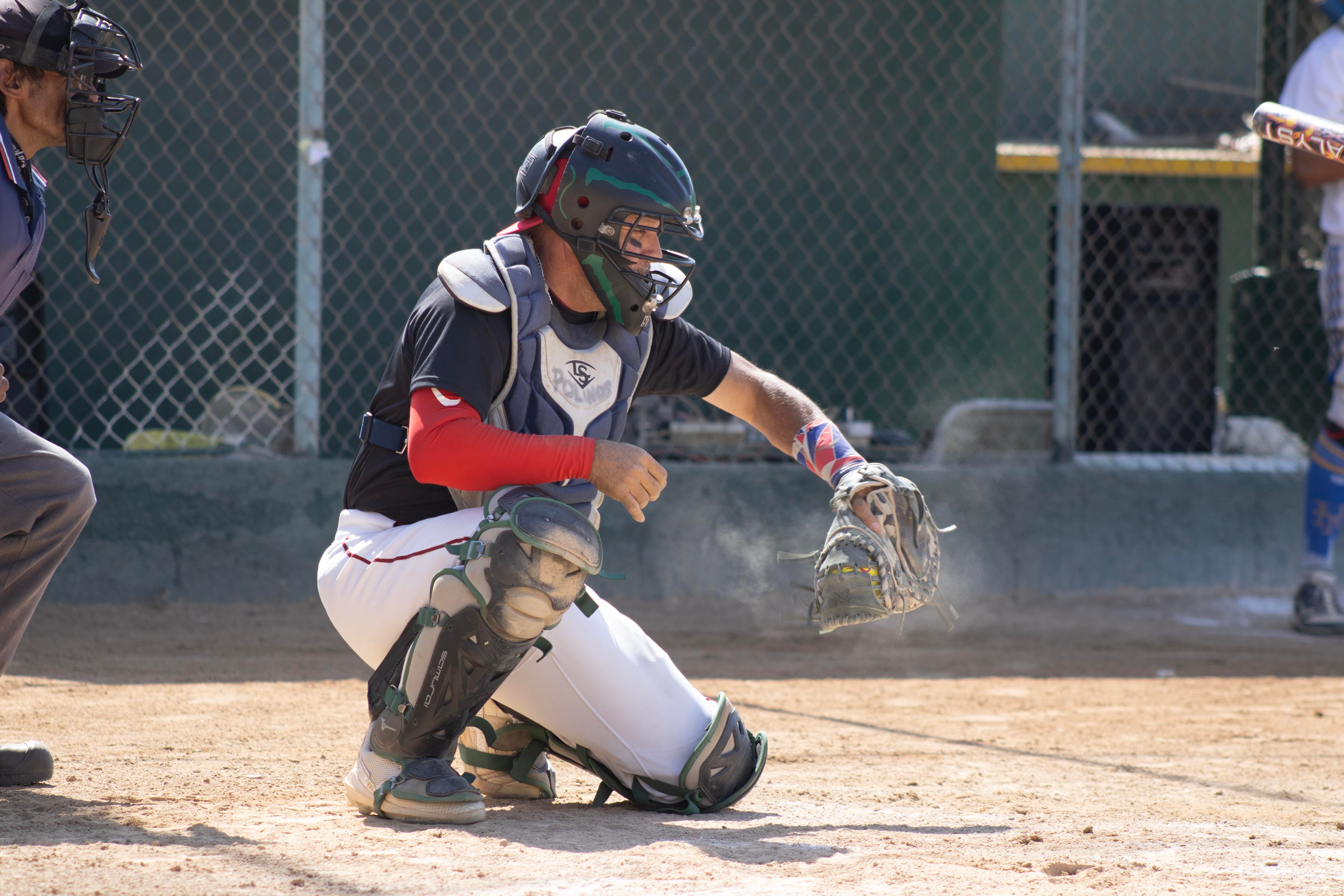 Baseball Catcher in Action on Sunny Day · Free Stock Photo