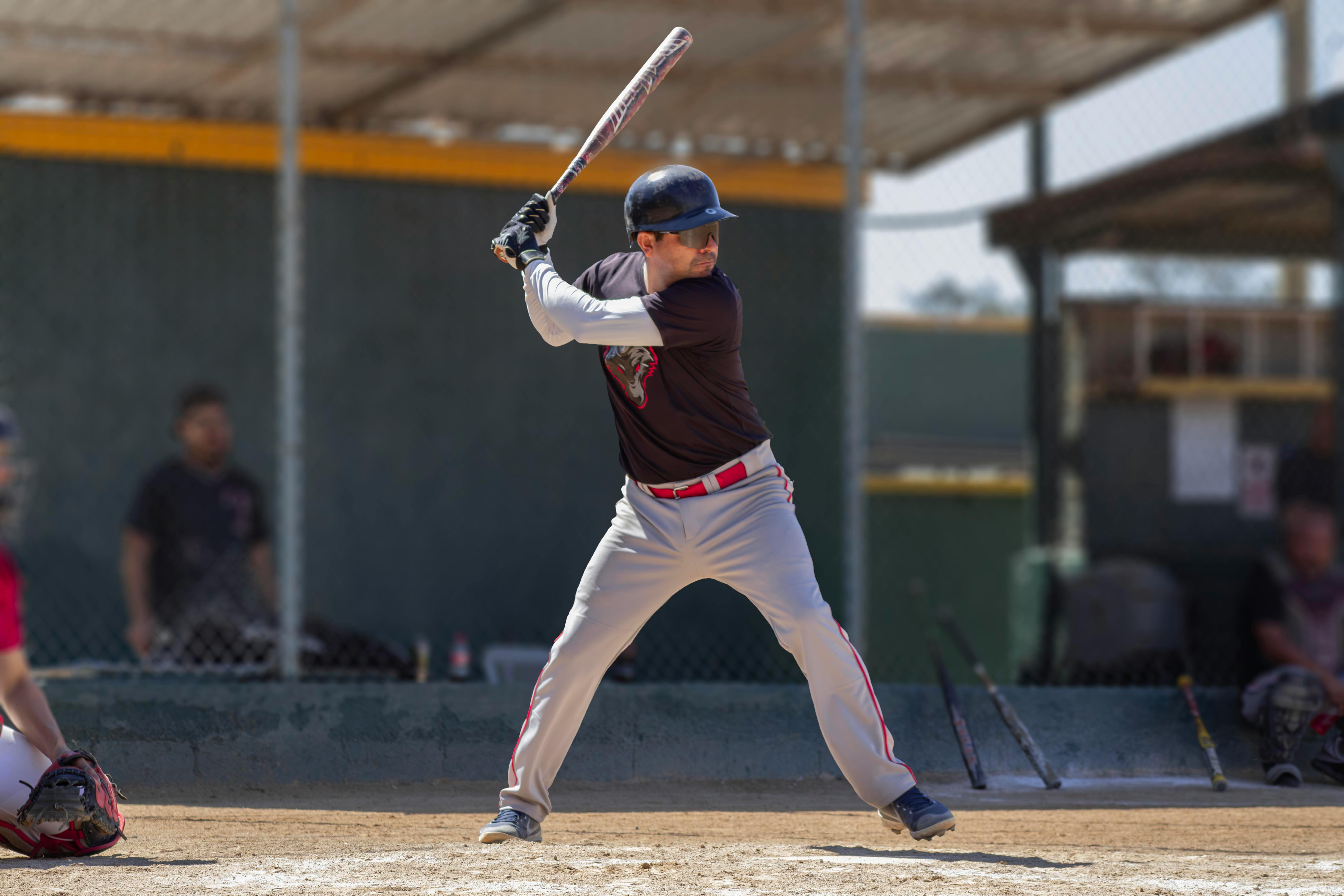 Baseball Player Ready to Swing at the Pitch · Free Stock Photo