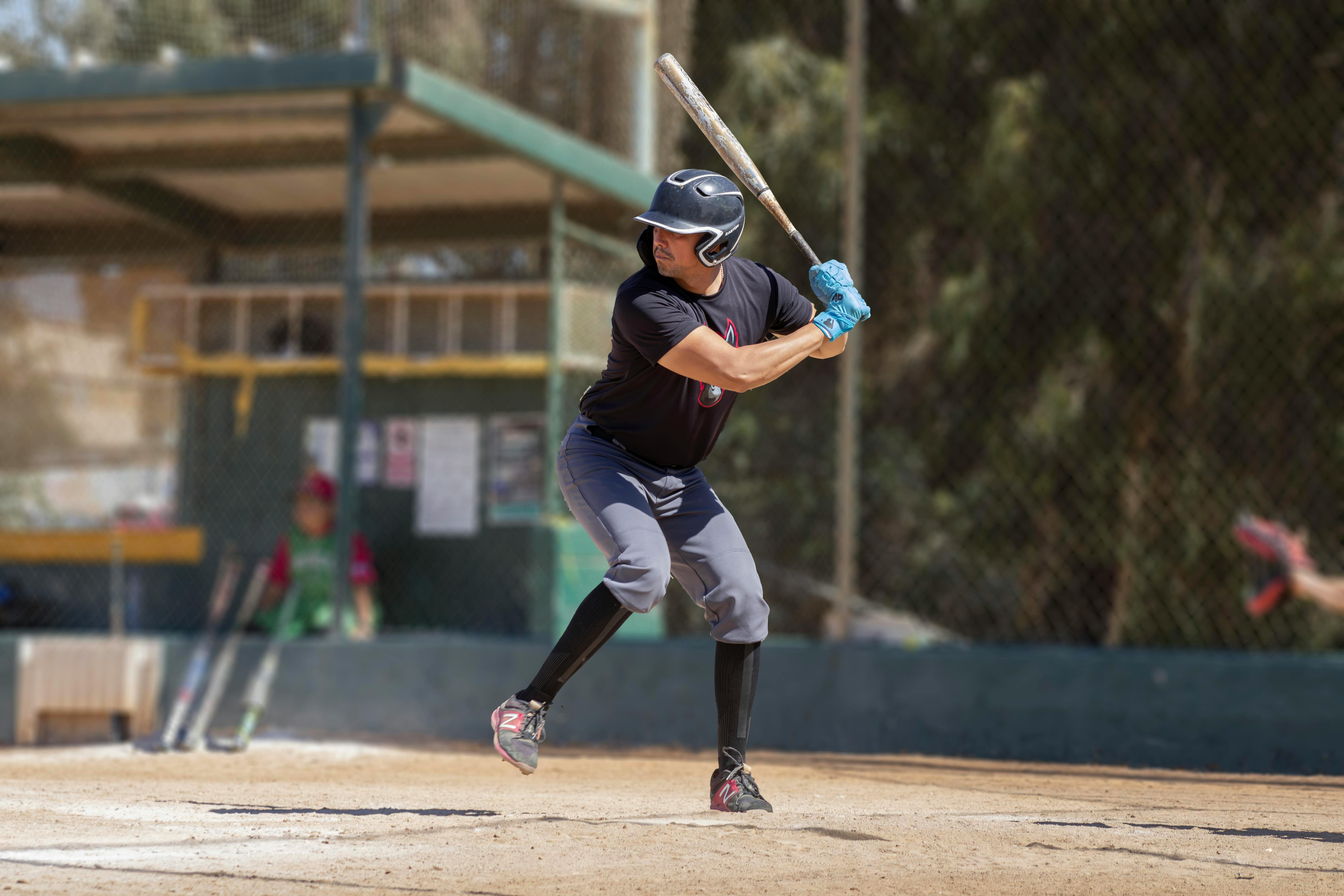 Baseball Player Ready to Swing at Bat · Free Stock Photo