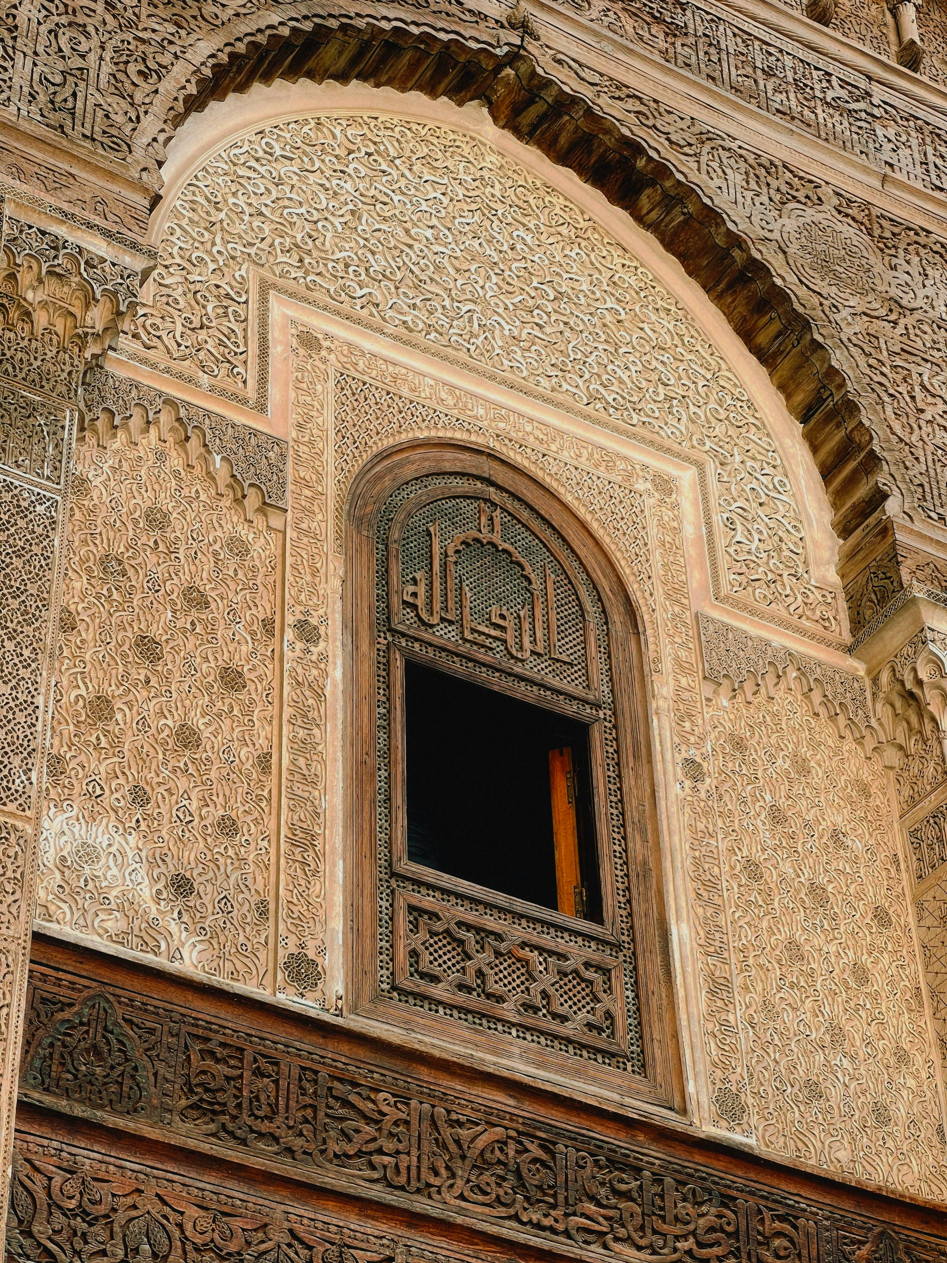 Intricate Moroccan Architectural Window in Fes · Free Stock Photo