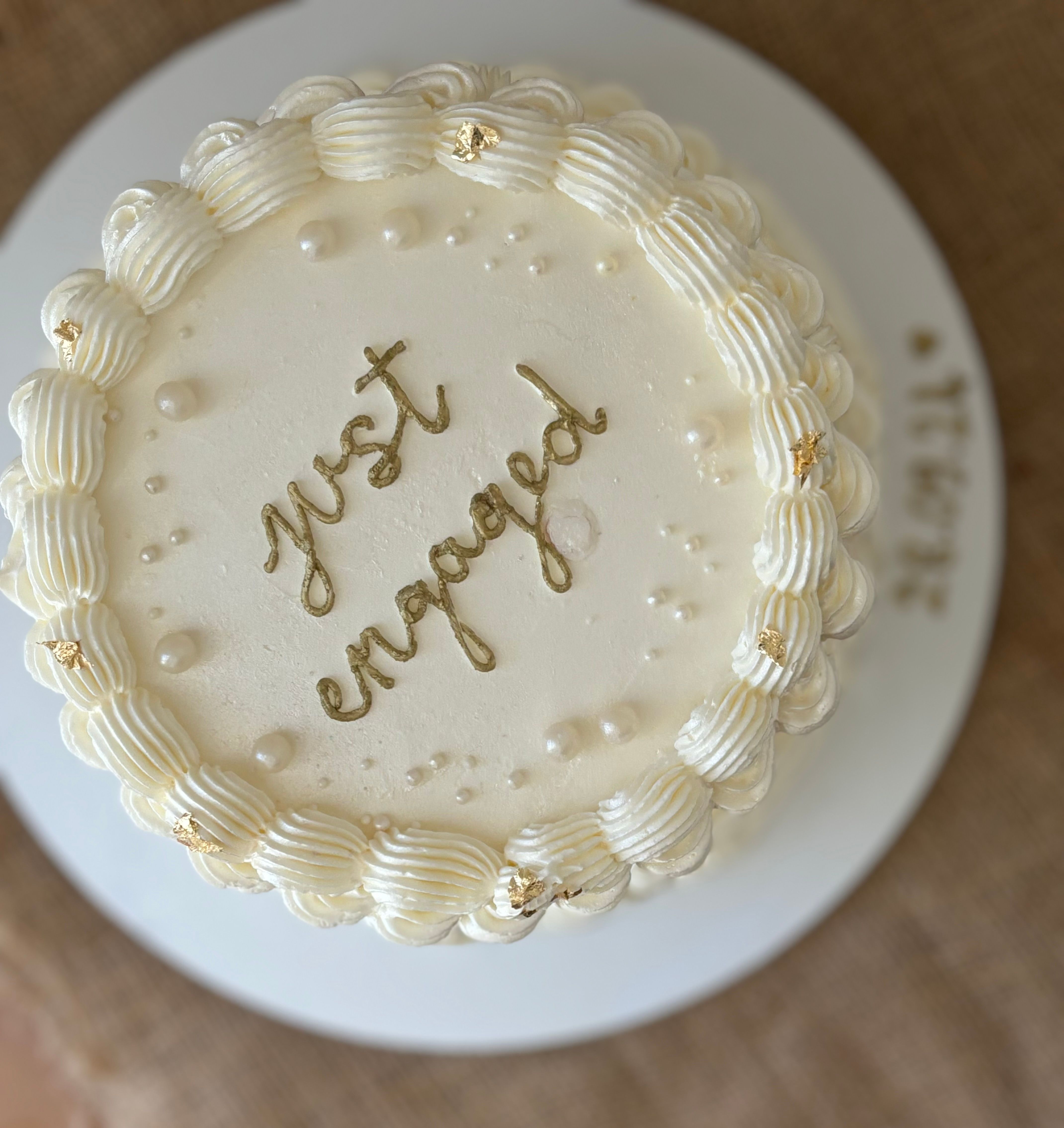 Elegant Engagement Cake with Gold Accents · Free Stock Photo