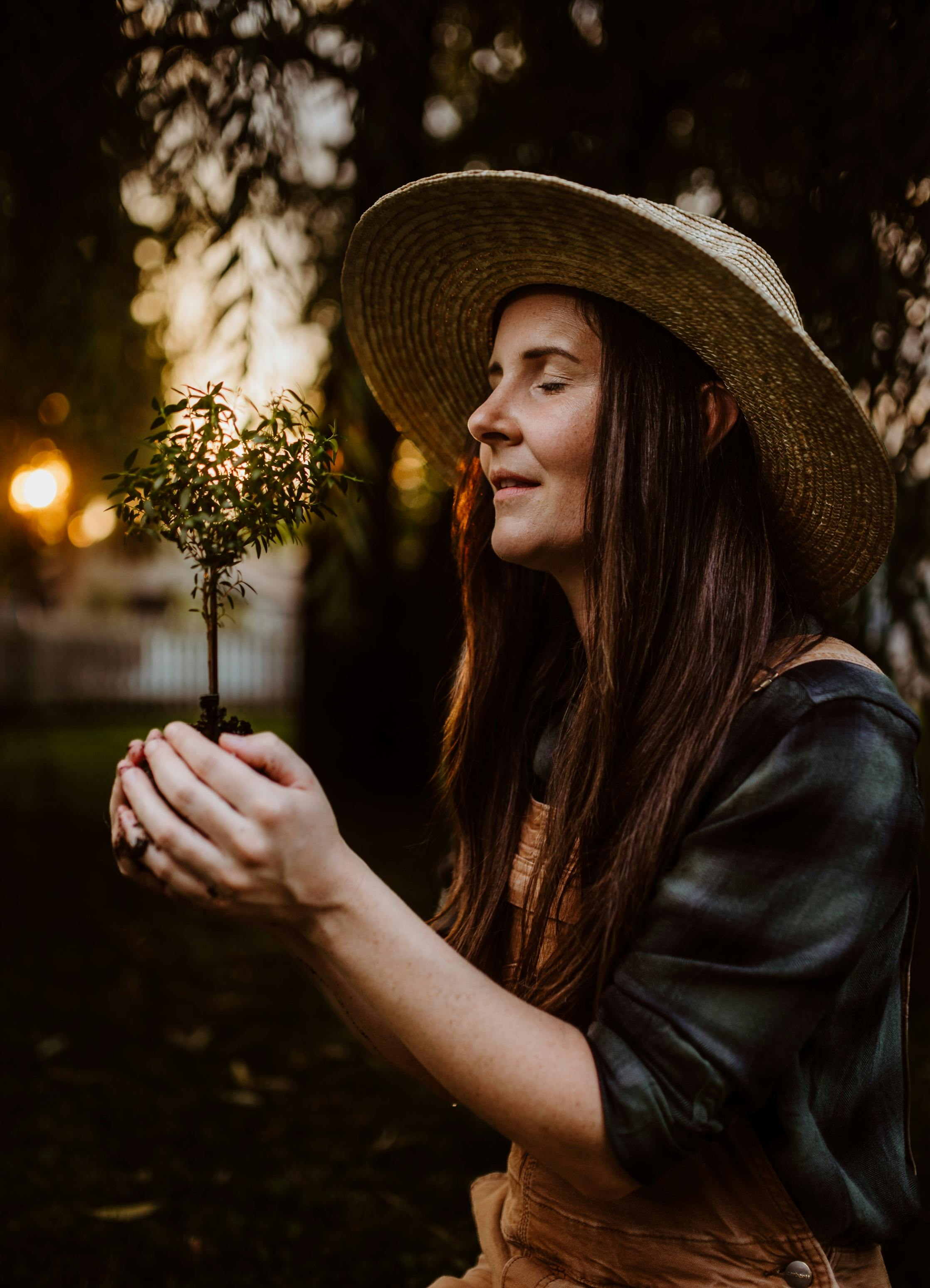 Woman Connecting with Nature at Sunset · Free Stock Photo