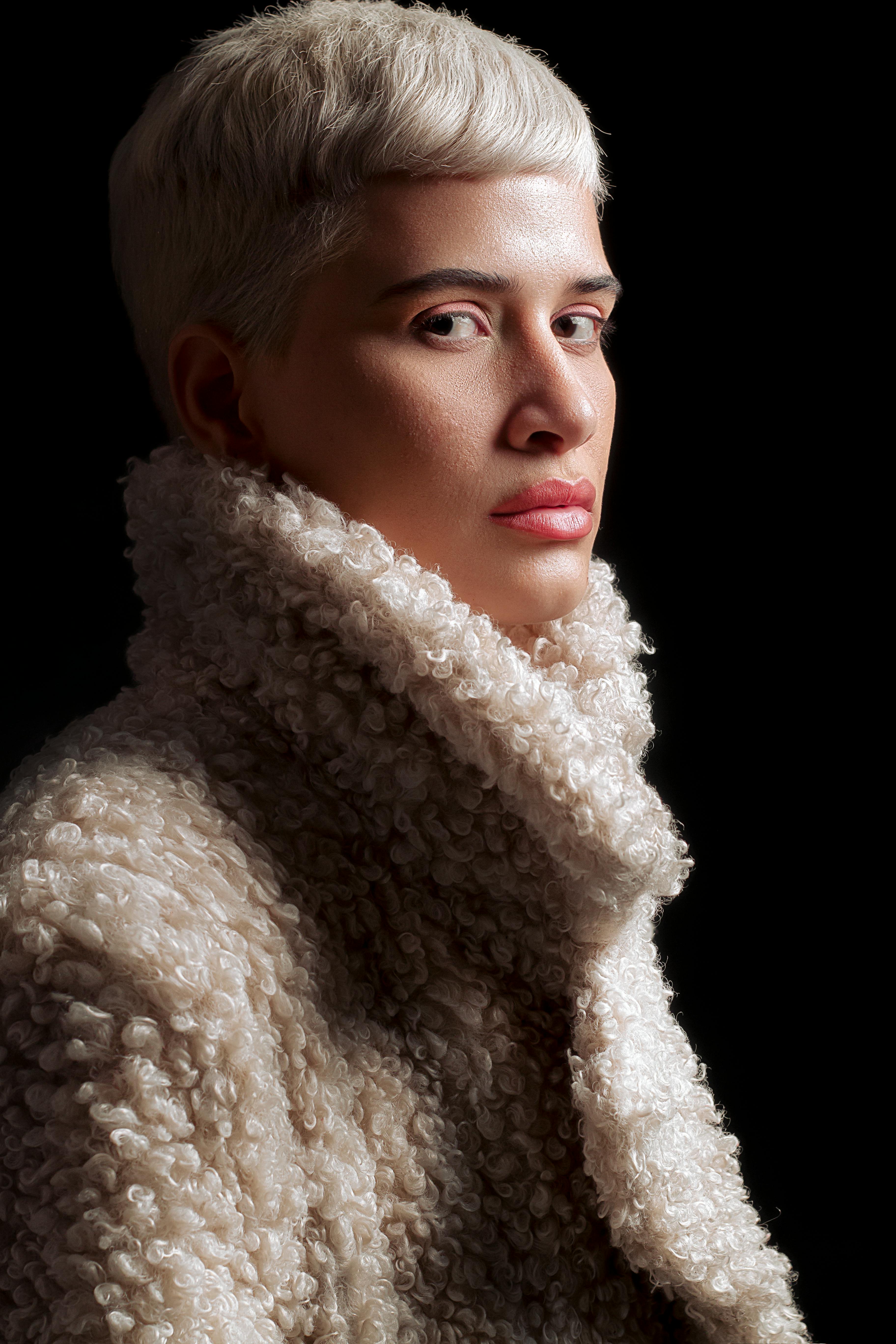 Stylish Portrait of a Young Fashionable Individual · Free Stock Photo