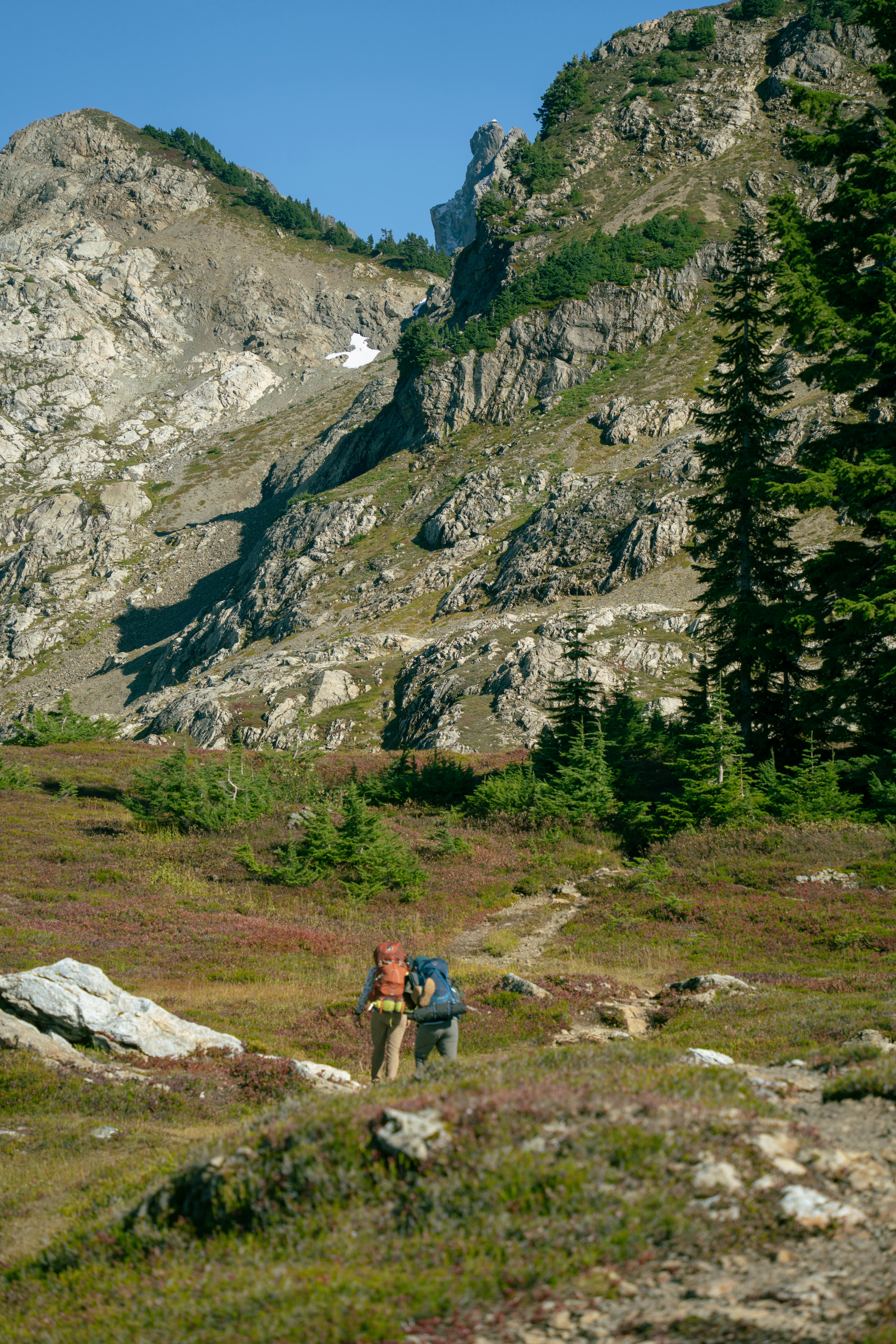 Hikers Exploring Rugged Mountains in Washington · Free Stock Photo