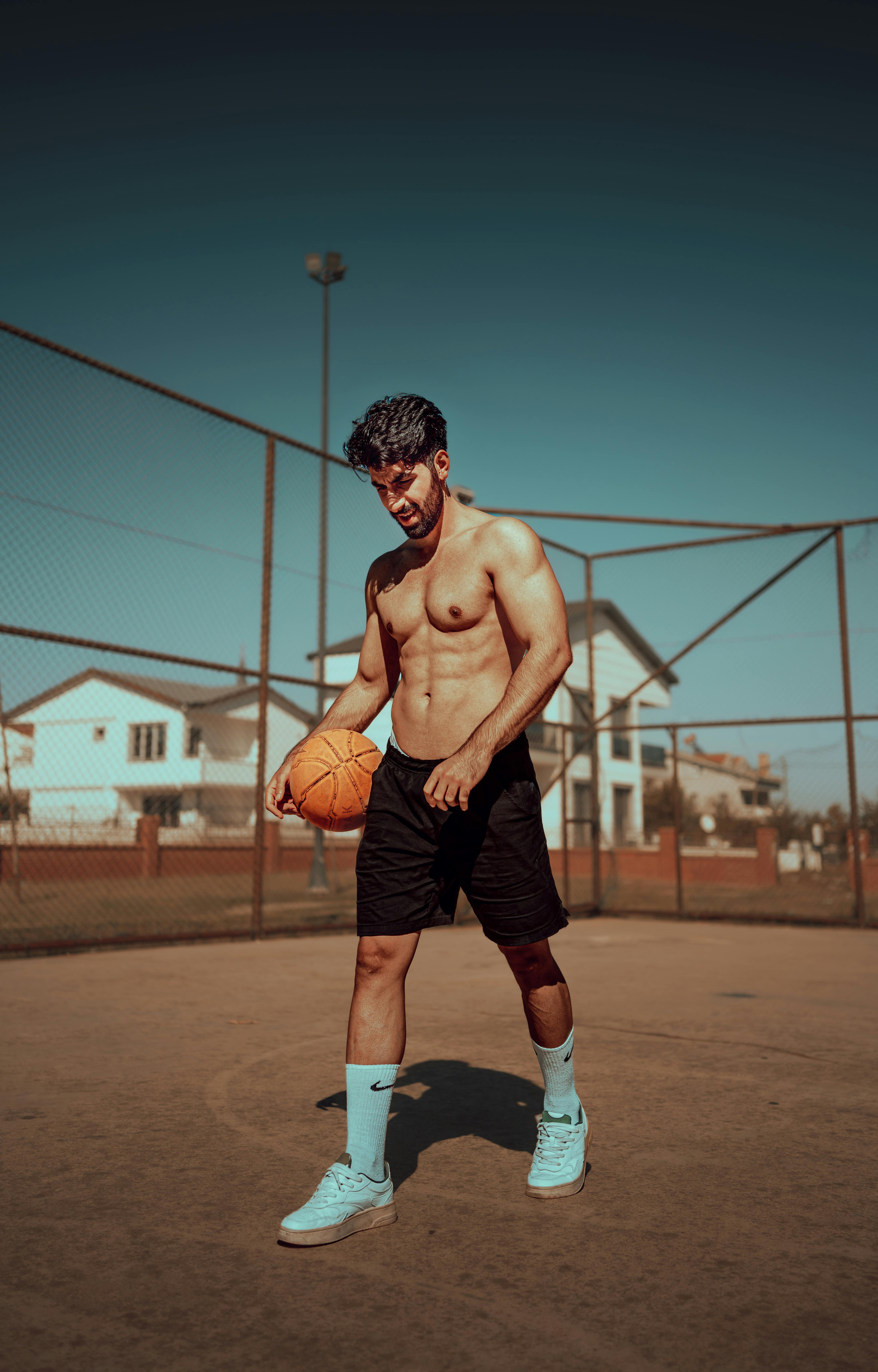 Athletic Man Playing Basketball Outdoors in Istanbul · Free Stock Photo