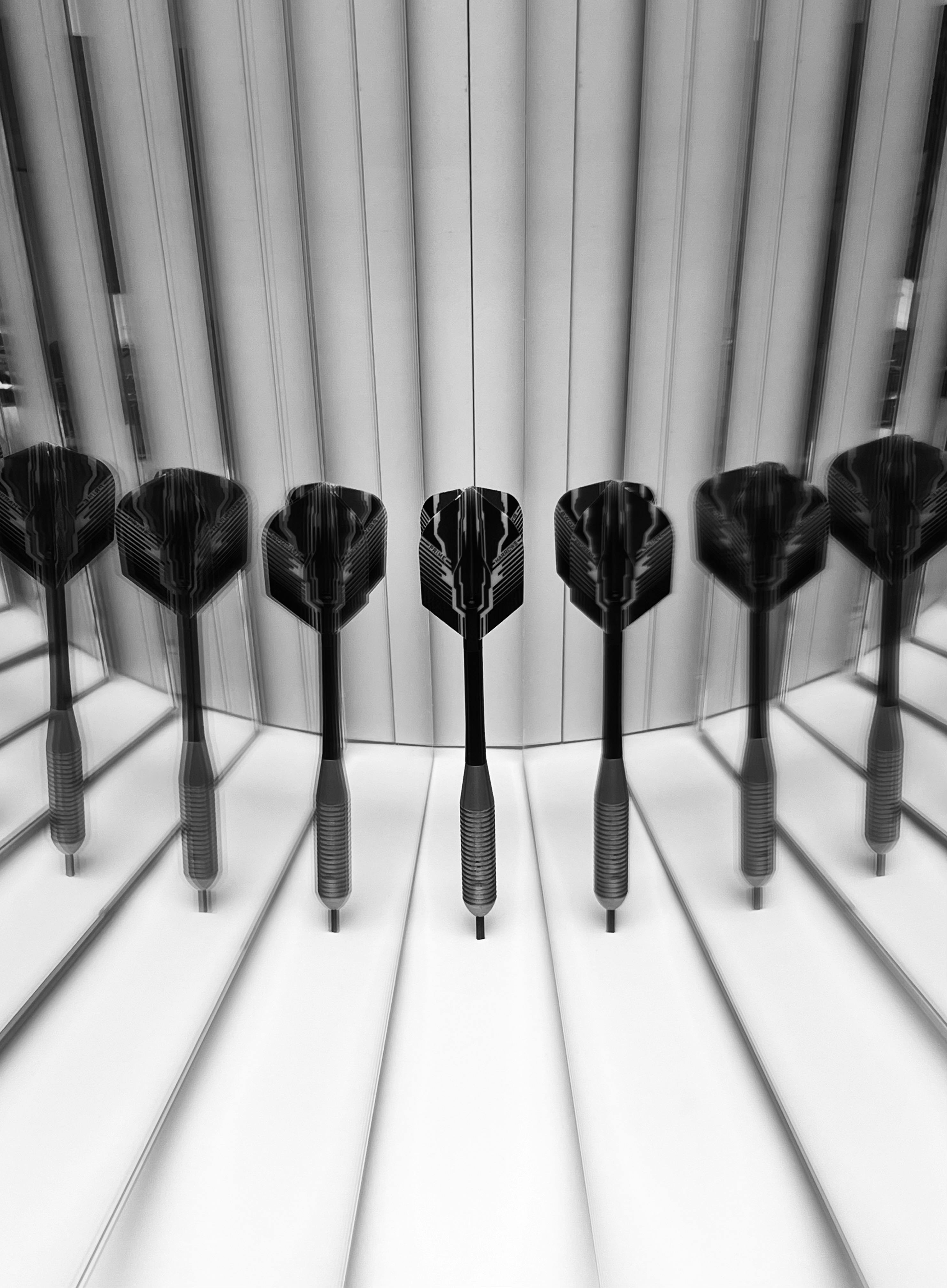 Black and White Geometric Dart Reflection · Free Stock Photo